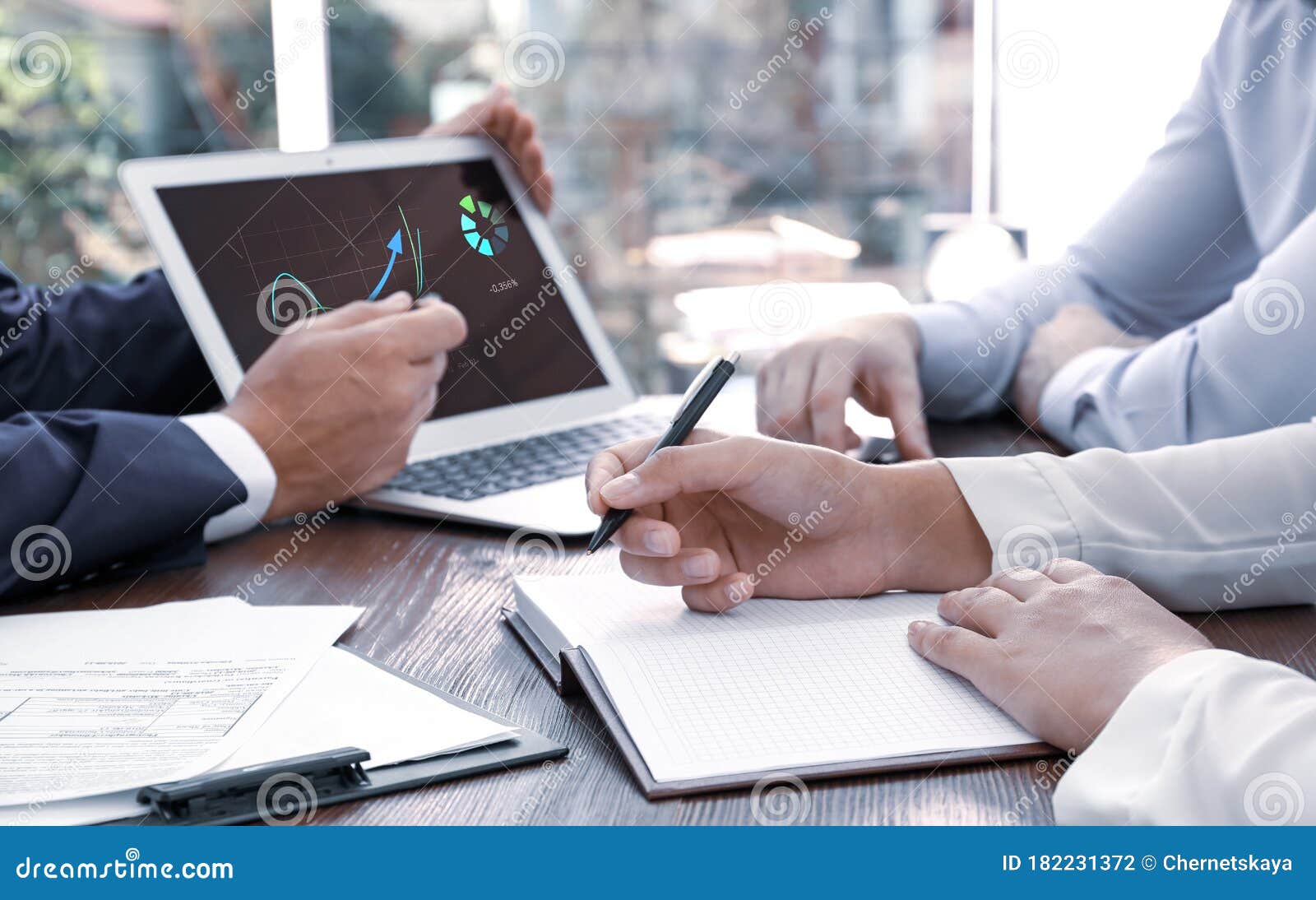 Brokers Working with Clients at Table in Office. Forex Trading Stock ...