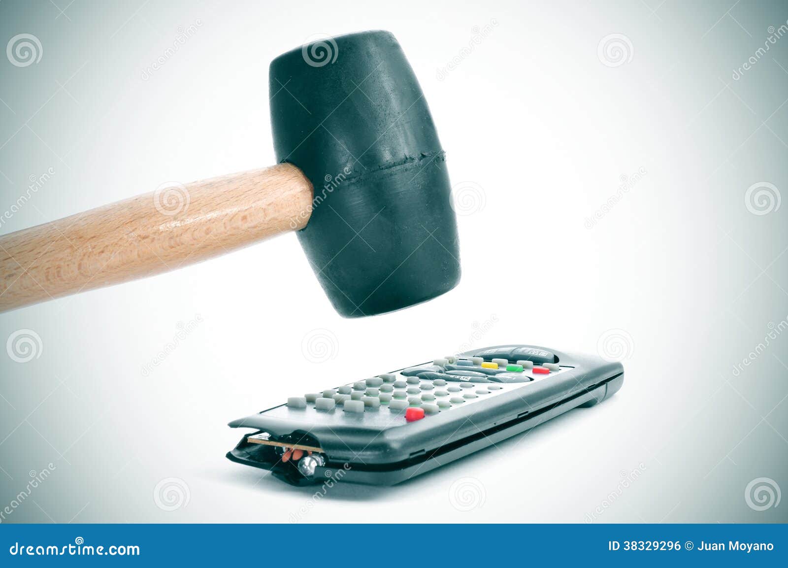 Broking a Remote Control with a Hammer Stock Photo - Image of player ...