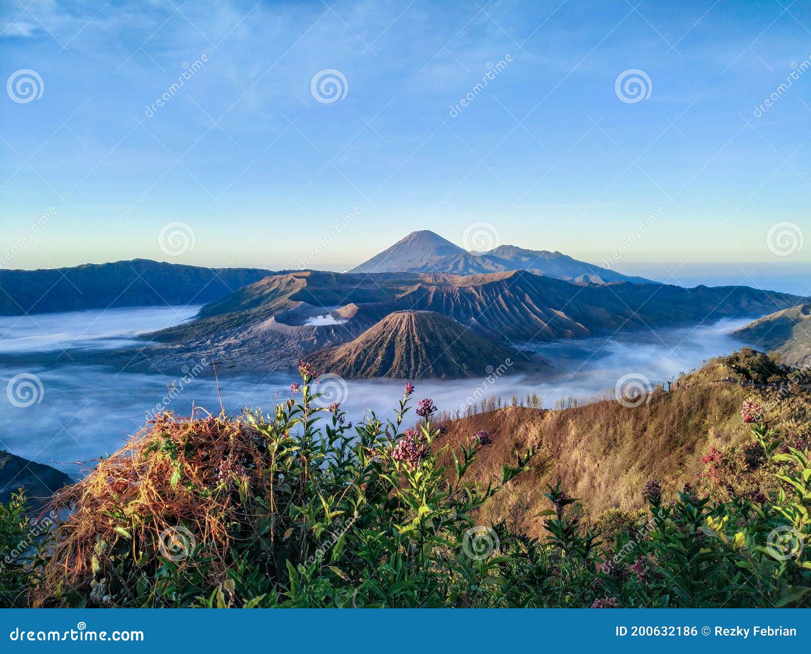 Bromo Mountain and Fog Around Bromo Mountain with Sunrise Stock Photo ...