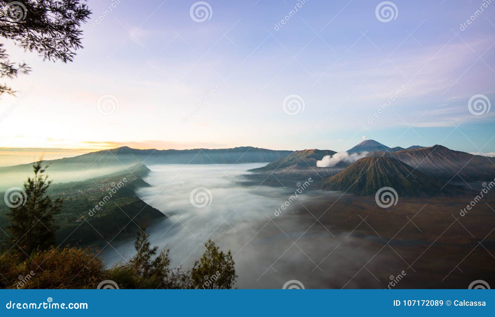 Mount Bromo during sunrise stock image. Image of mist - 107172089