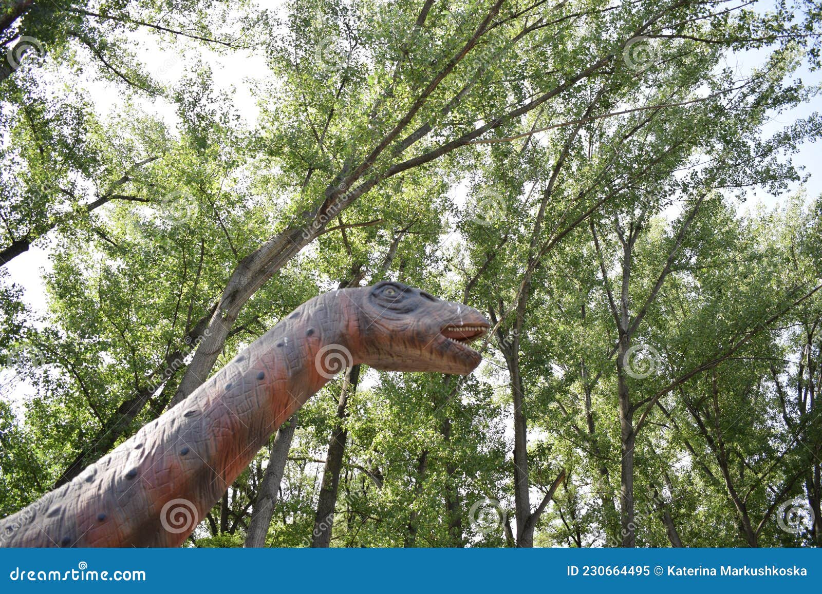 Brontosaurus Head in Tree Branches. Editorial Image - Image of ...