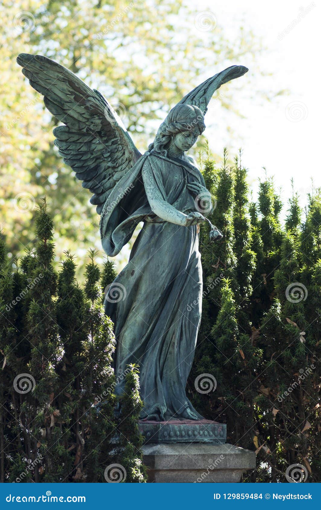 Bronze Angel on Tomb in Cemetery Stock Photo - Image of background ...