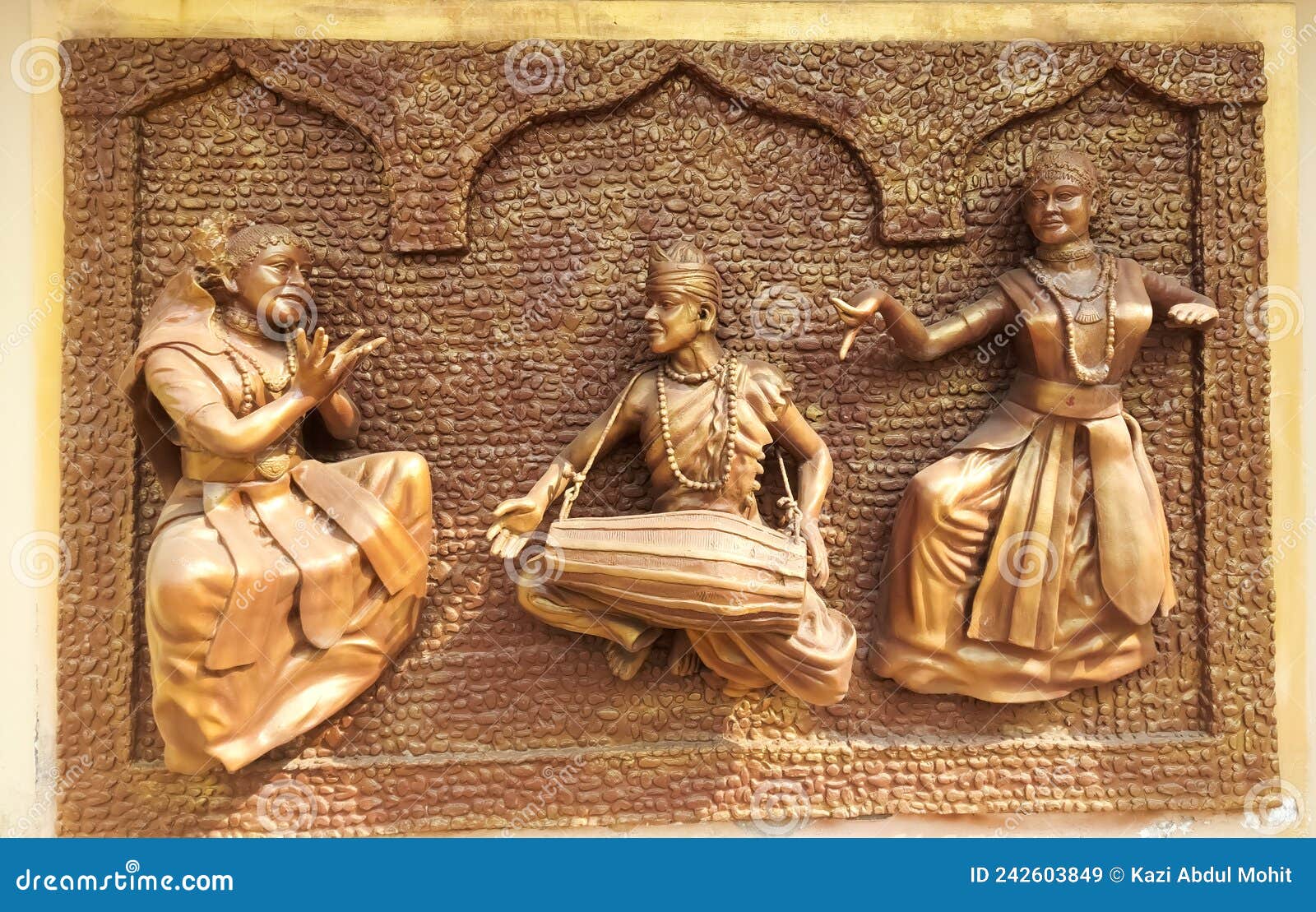 A Bronze Art Work on Indian Classical Dance Mounted on the Wall. Stock ...