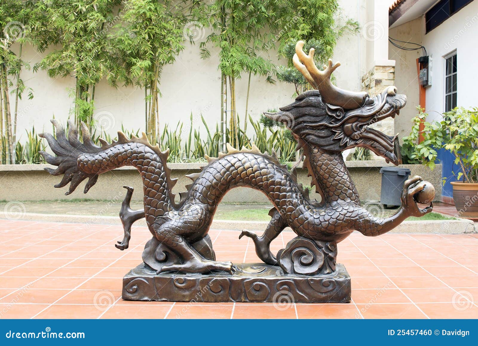 Bronze Chinese Dragon Statue Stock Photo - Image of chinese, bamboo ...