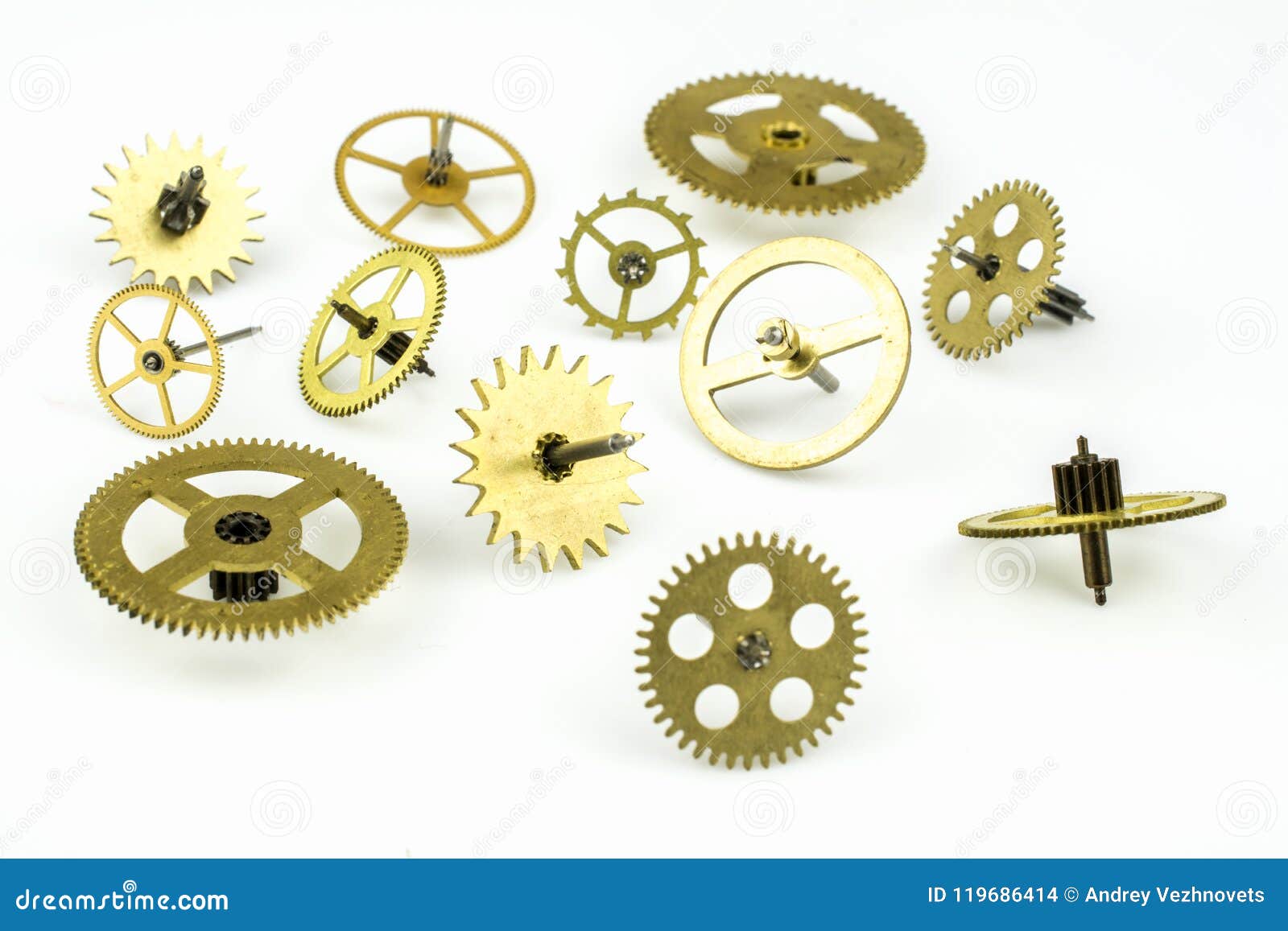 Bronze Cog-wheels from a Clock Isolated on a White Background. Stock ...