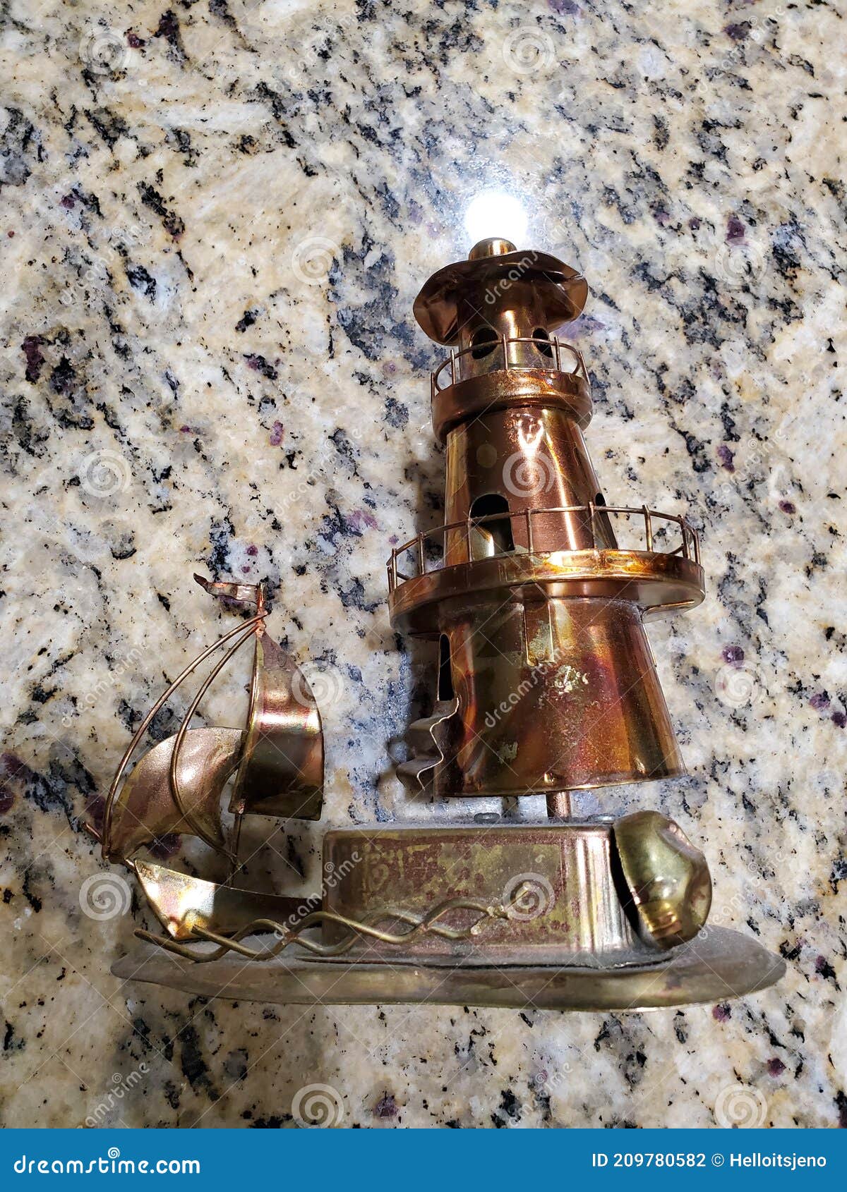 Bronze Lighthouse Music Box Stock Photo - Image of wheel, tire: 209780582