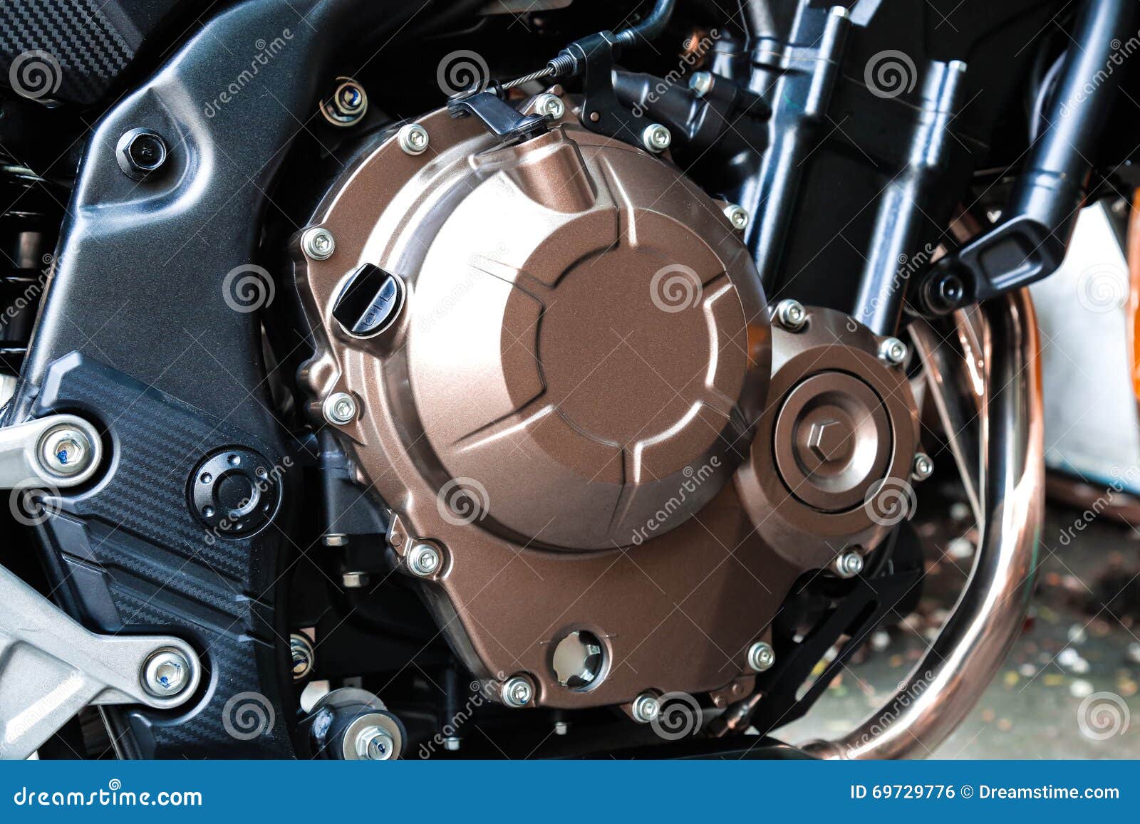 A bronze motorcycle engine stock photo. Image of damper - 69729776