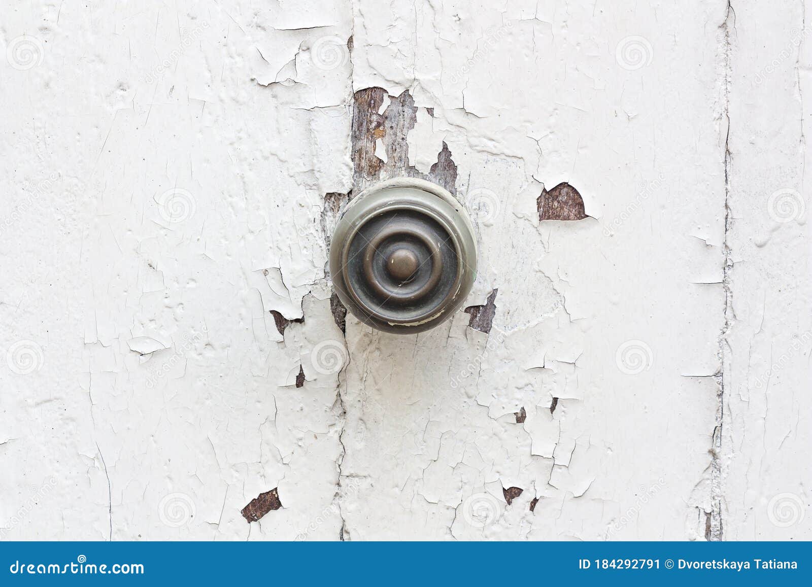 The Bronze Round Handle on the Old White Front Door Stock Image - Image ...