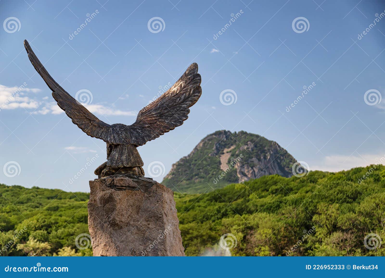Bronze Statue of the Eagle on Background of Mountains Stock Image ...