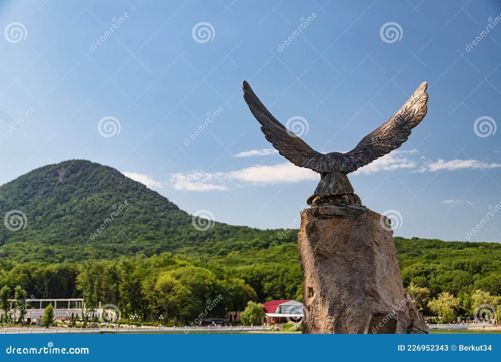 Bronze Statue of the Eagle on Background of Mountains Stock Image ...