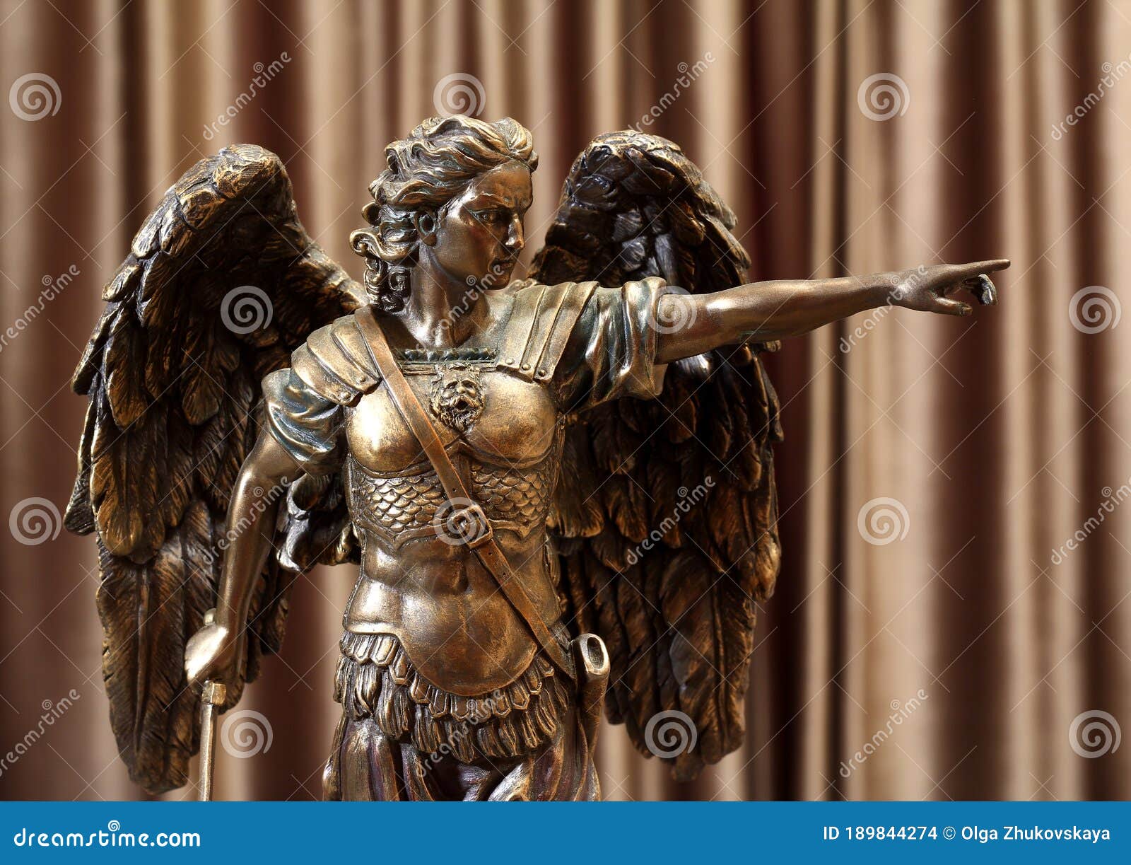 Statuette Of Archangel Michael With Wings And Sword Stock Photo ...