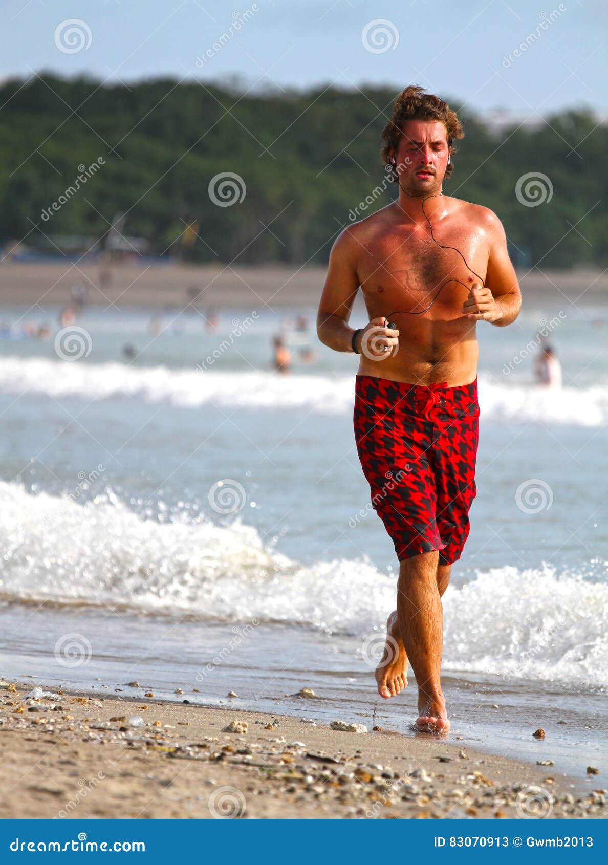 BRONZED MAN RUNNING on BEACH Editorial Stock Photo - Image of ...