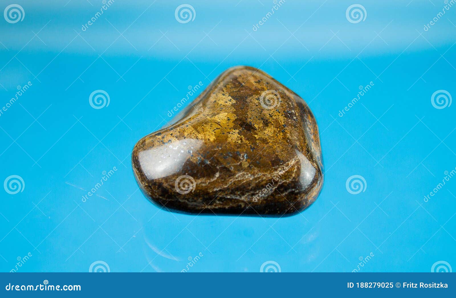 A Bronzite As Tumbled Gemstone and Healing Stone Stock Image - Image of ...