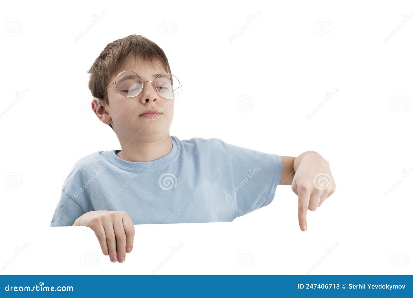 Brooding Boy in Large Glasses Points His Finger Down at Empty Space ...