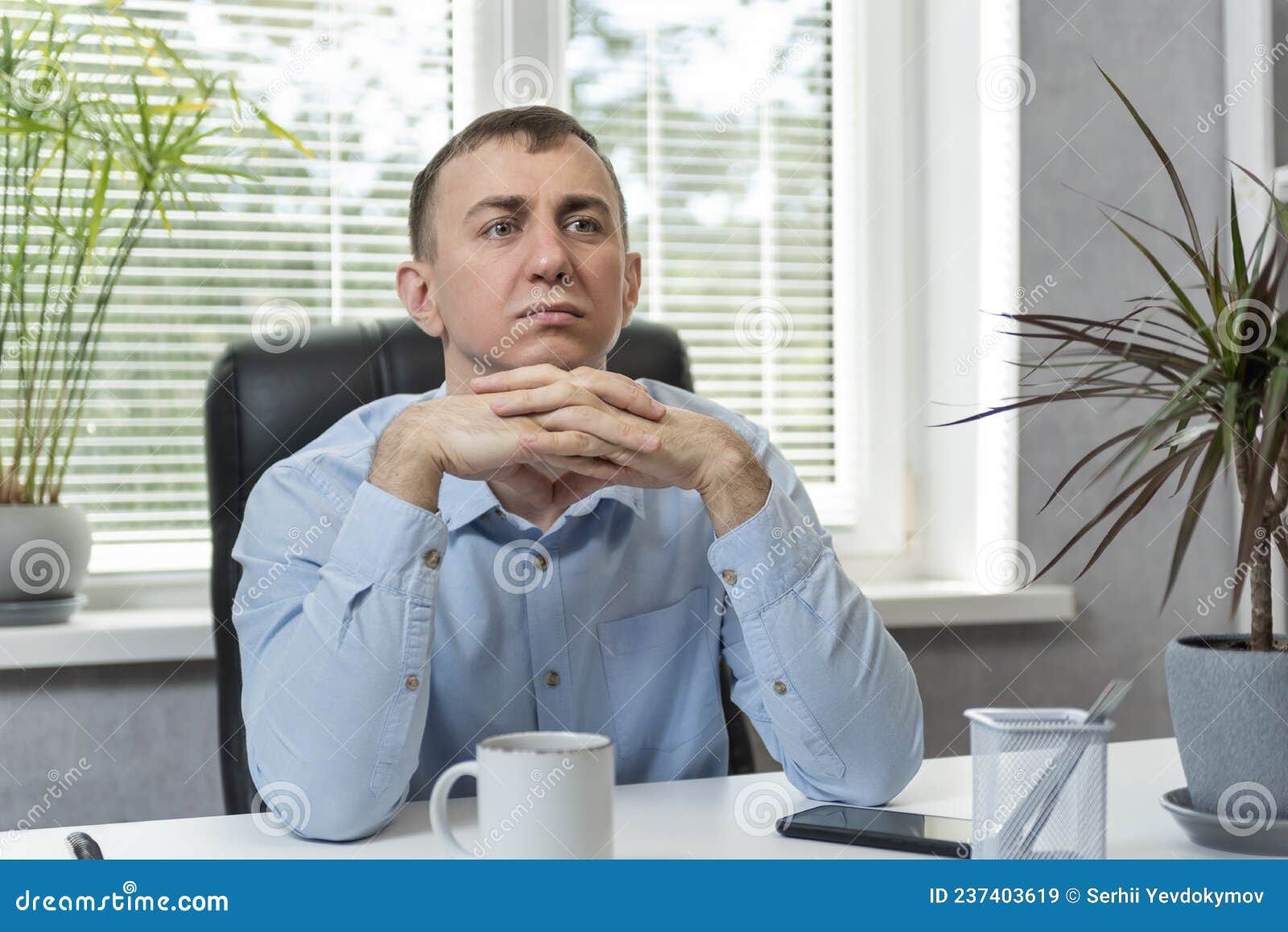 Brooding Young Guy In A Santa Suit On A Yellow Background Royalty-Free ...