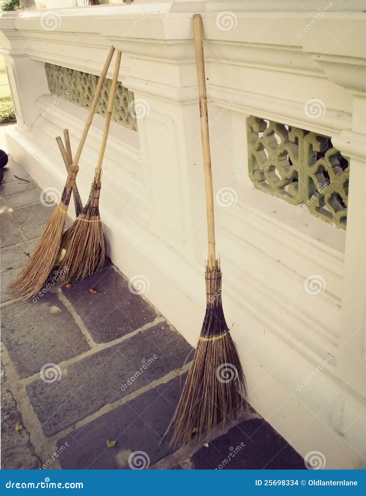 Brooms on the Stone Sidewalk Stock Photo - Image of siesta, group: 25698334