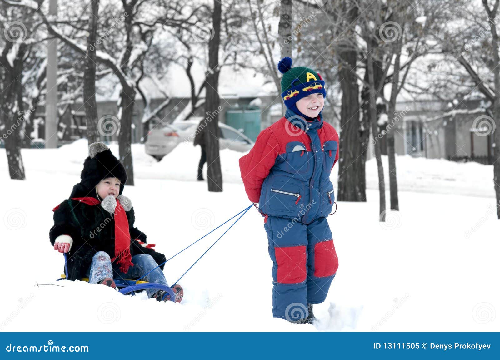 Brother Pulling His Sister Kids Toboggan Sled Snow. Little Girl And Boy ...