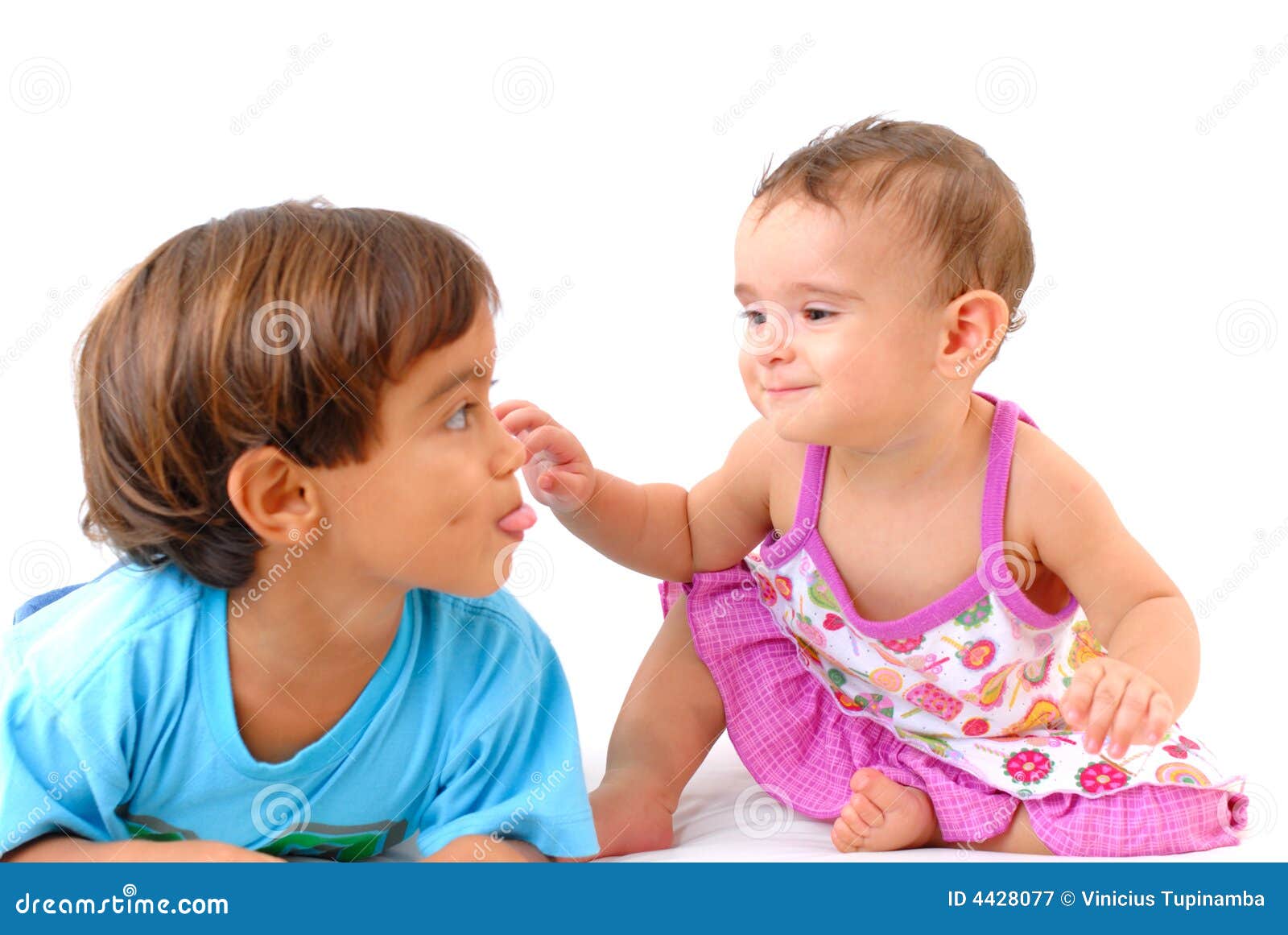 Gorgeous Brother And Sister Sunbathing On A Sandy Beach Stock Photo ...