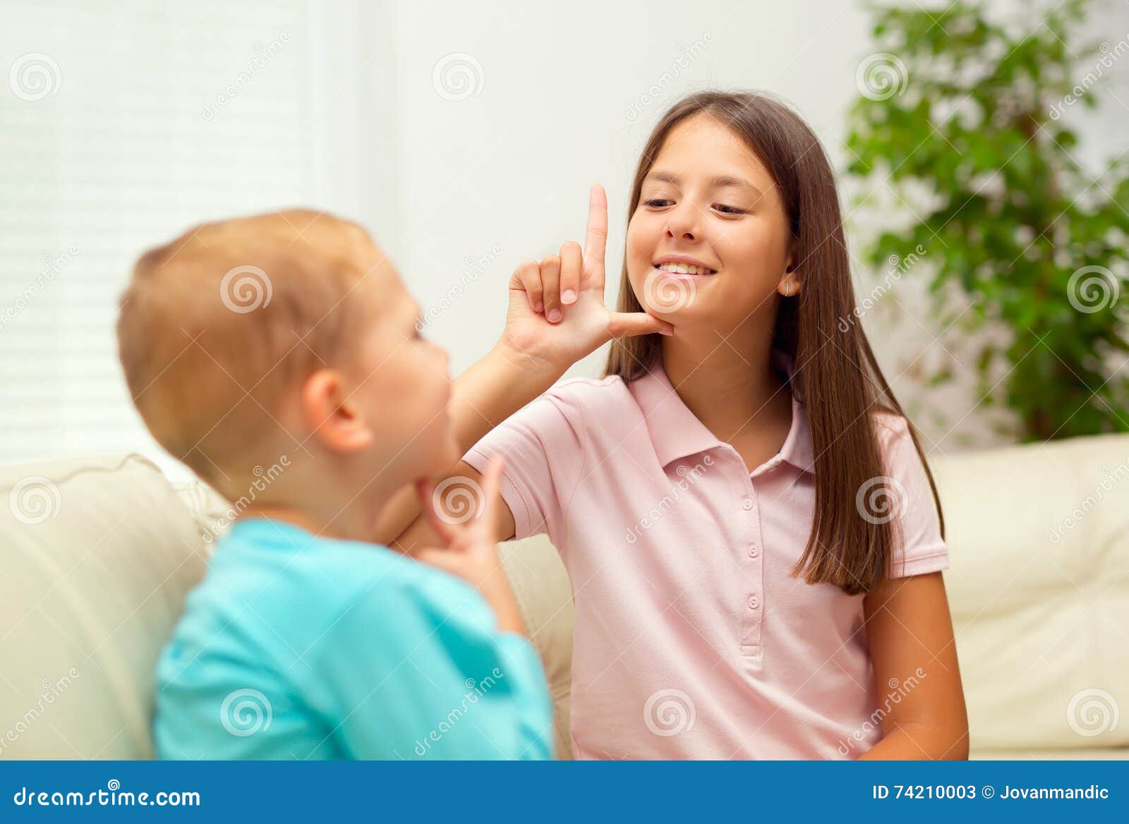Brother and Sister Learn Sign Language Stock Image - Image of implant ...