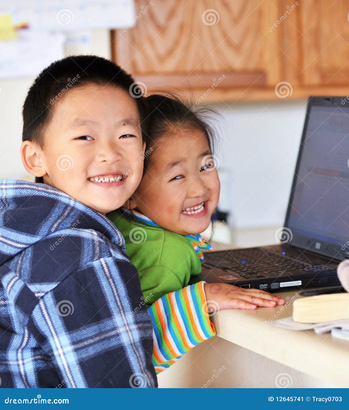 Brother and Sister with Notebook Stock Image - Image of blue, indoor ...