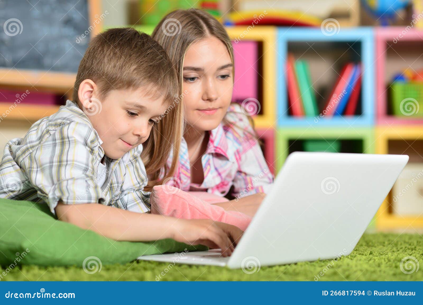 Brother and Sister Playing Computer Stock Photo - Image of modern ...