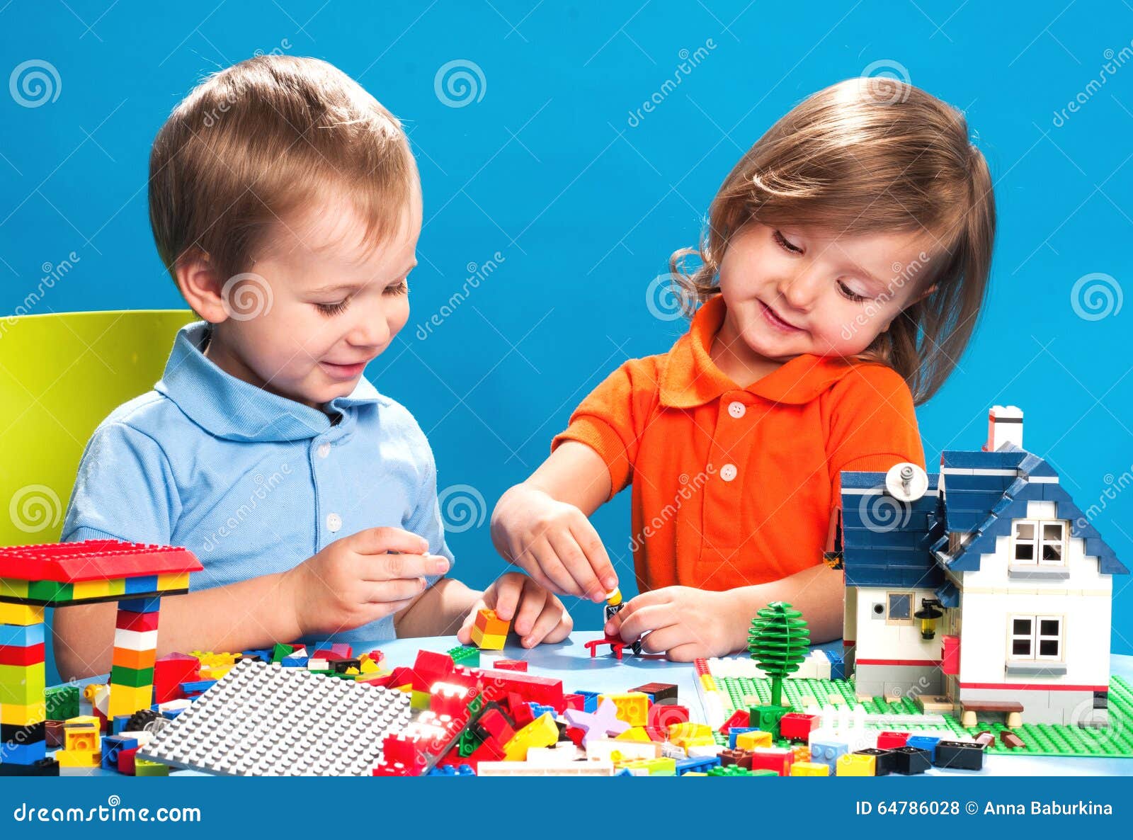 Brother and Sister Playing with Construction Blocks Stock Photo - Image ...