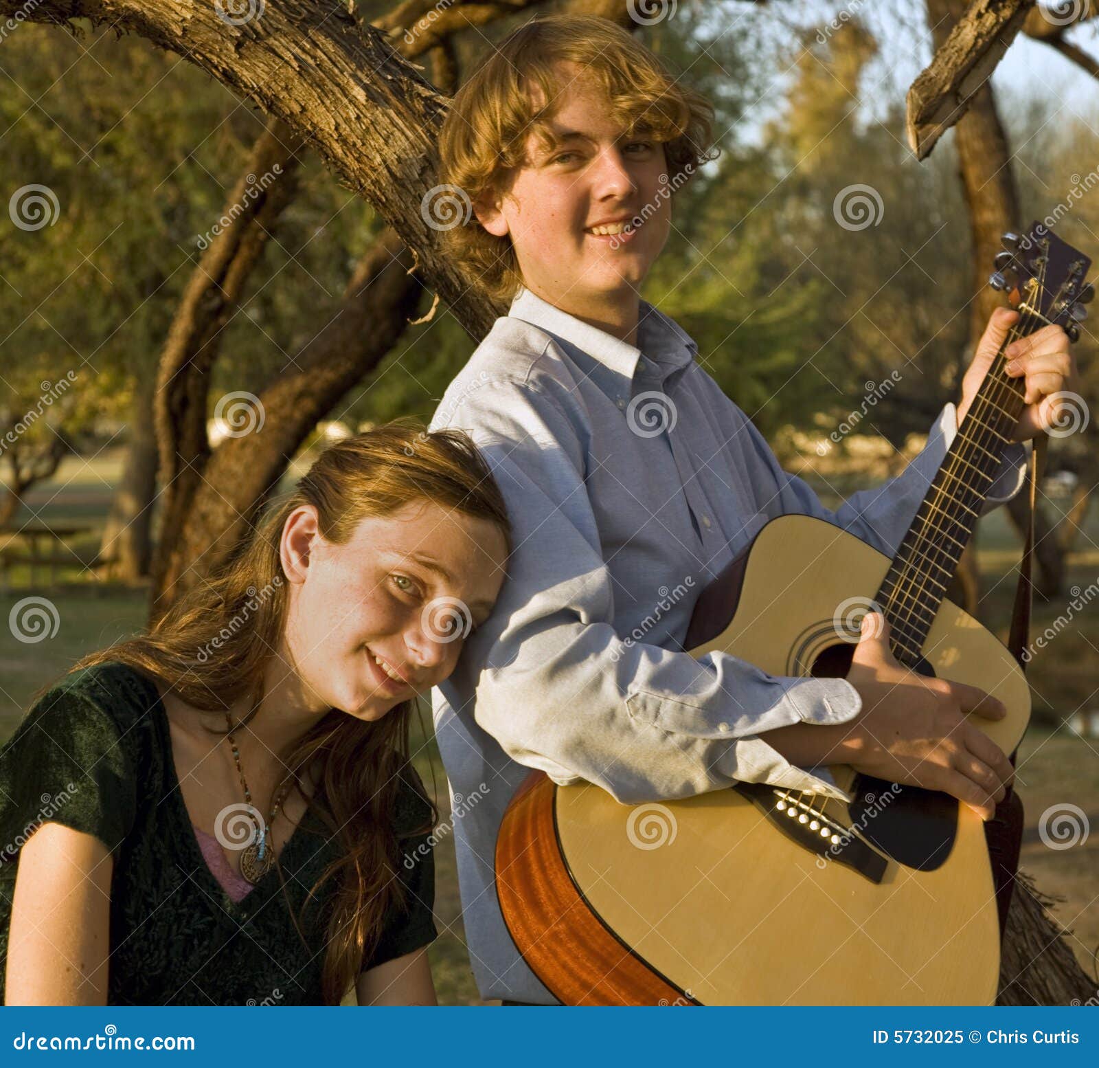 Brother and Sister Playing Music Stock Image - Image of musician, green ...