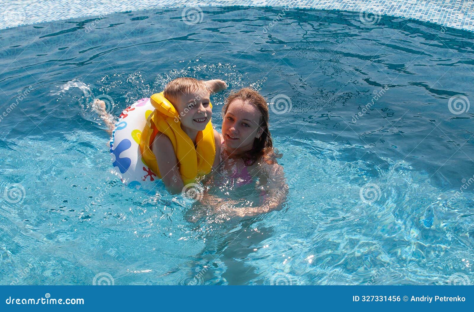 Brother and Sister Playing in the Pool Stock Photo - Image of ...
