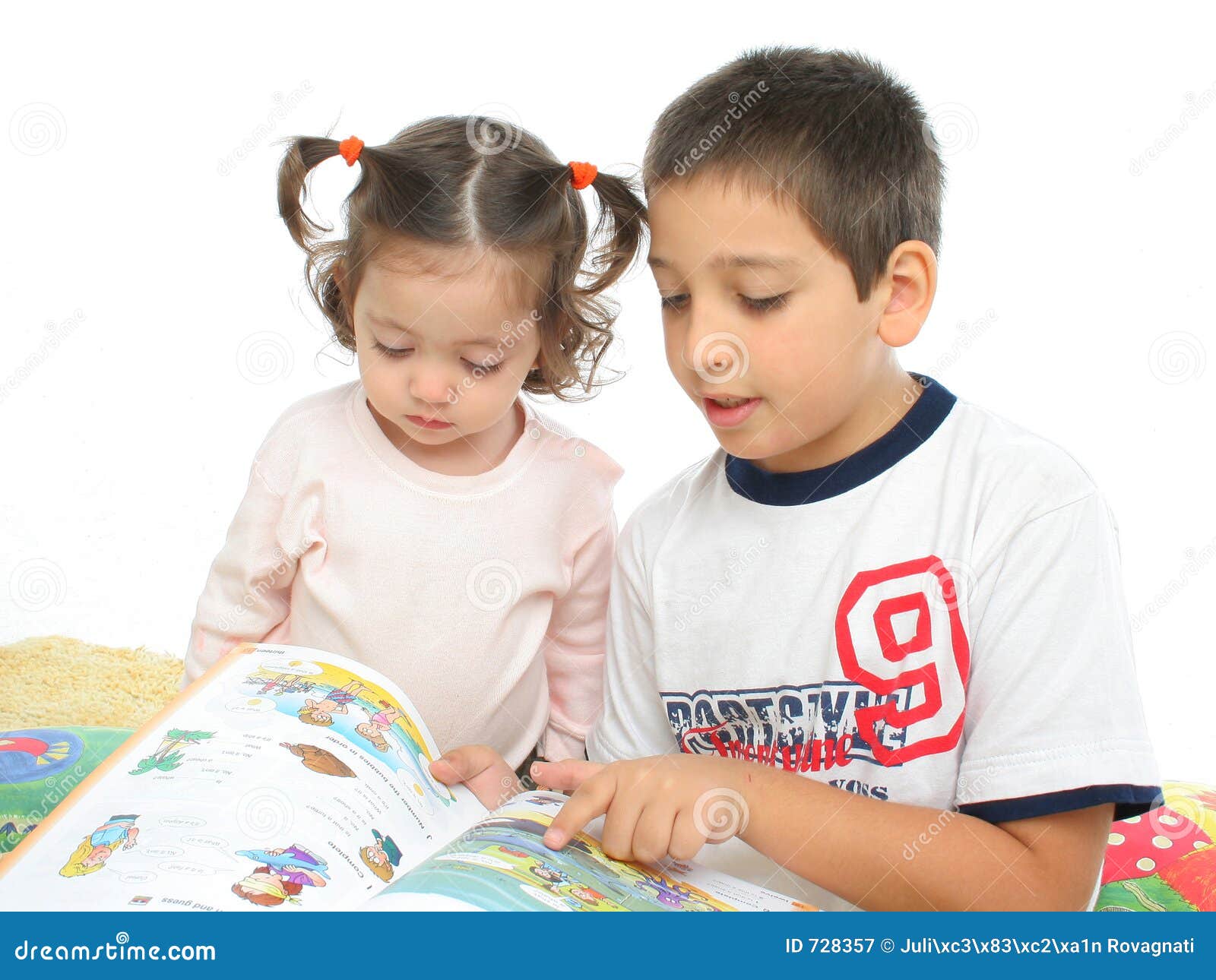 Brother and Sister Reading a Book on the Floor Stock Image - Image of ...