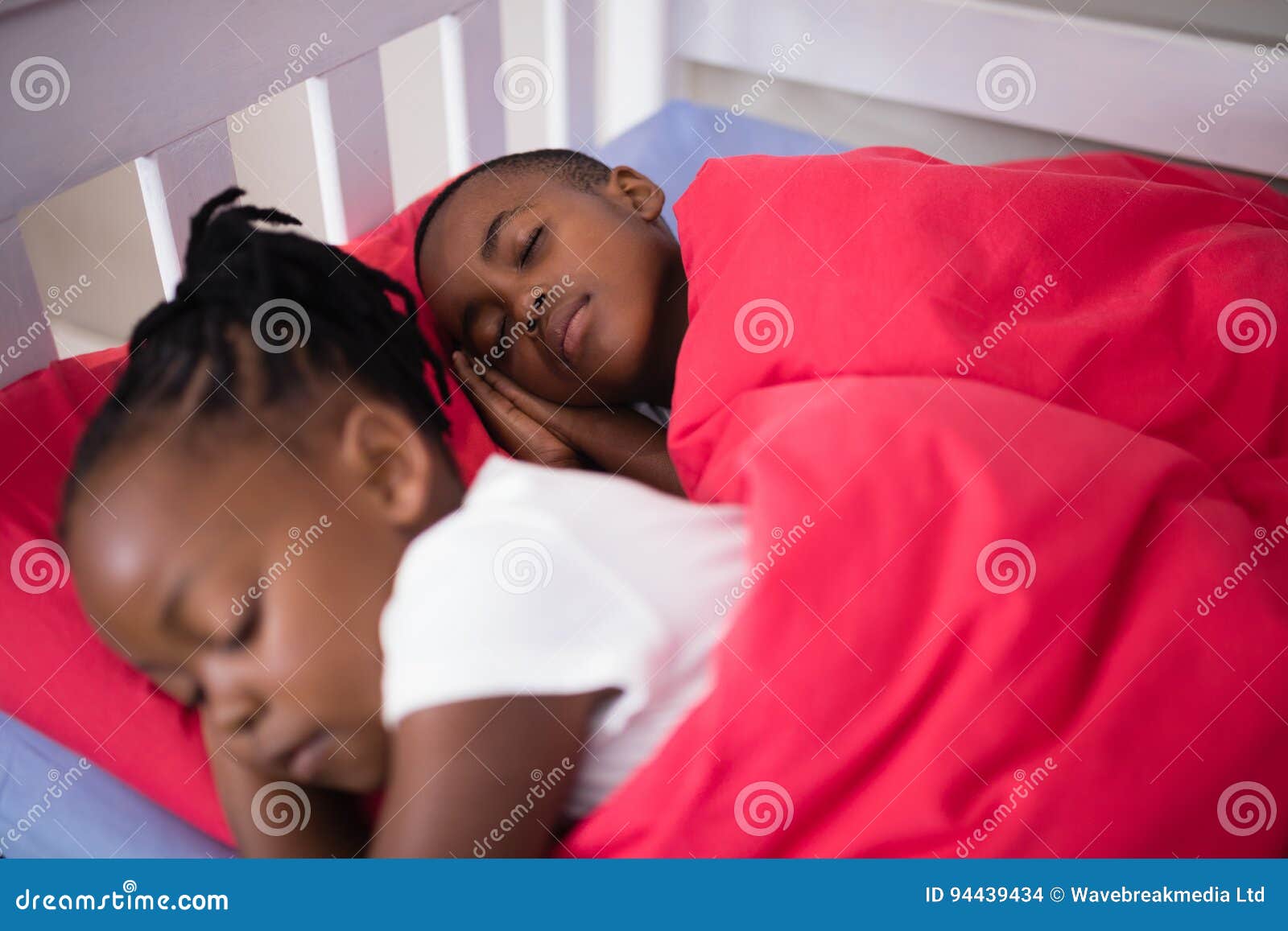 Brother and Sister Sleeping on Bed at Home Stock Photo - Image of ...