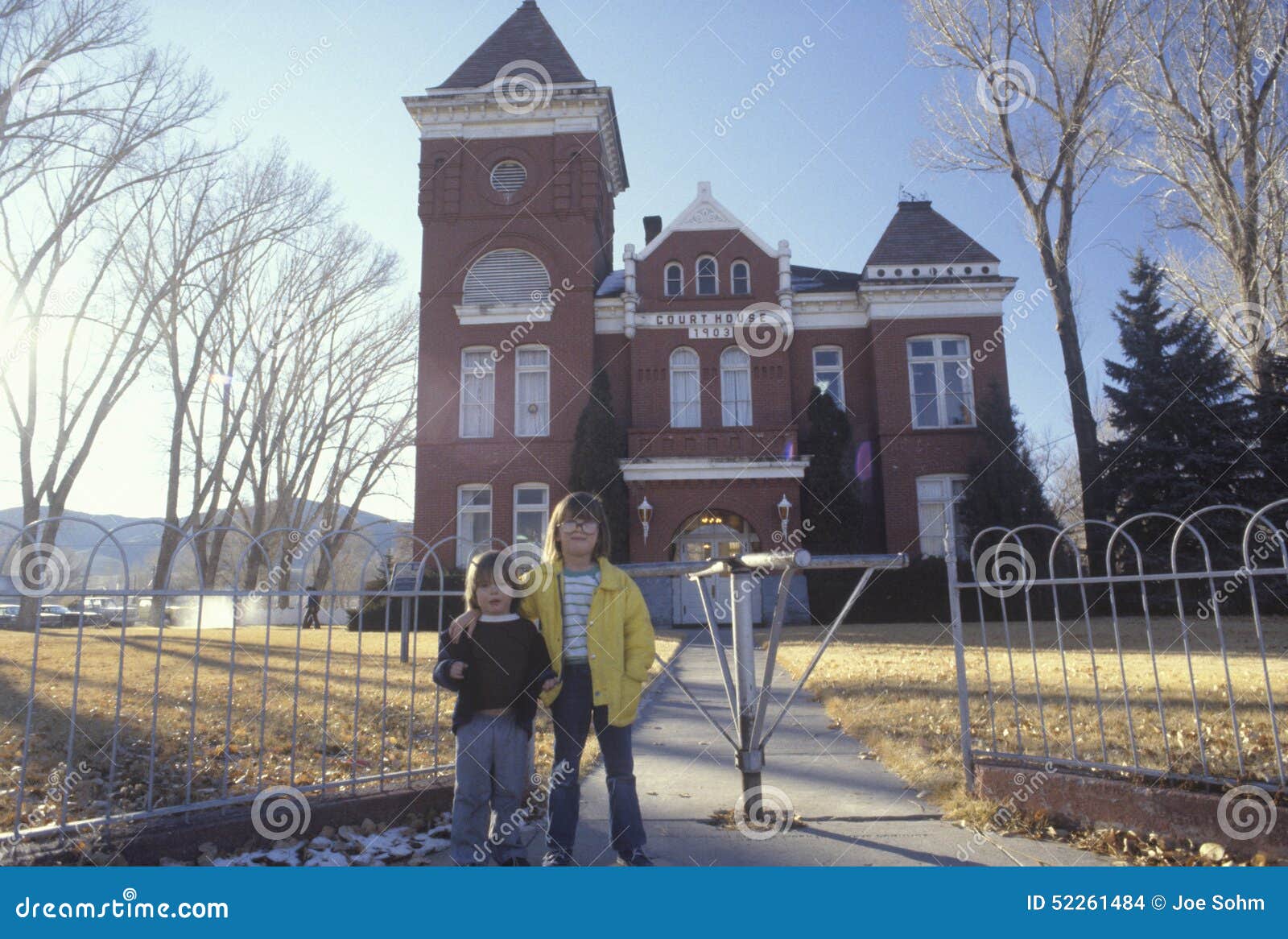 Brother and Sister Standing in Front of a Rural Courthouse Editorial ...