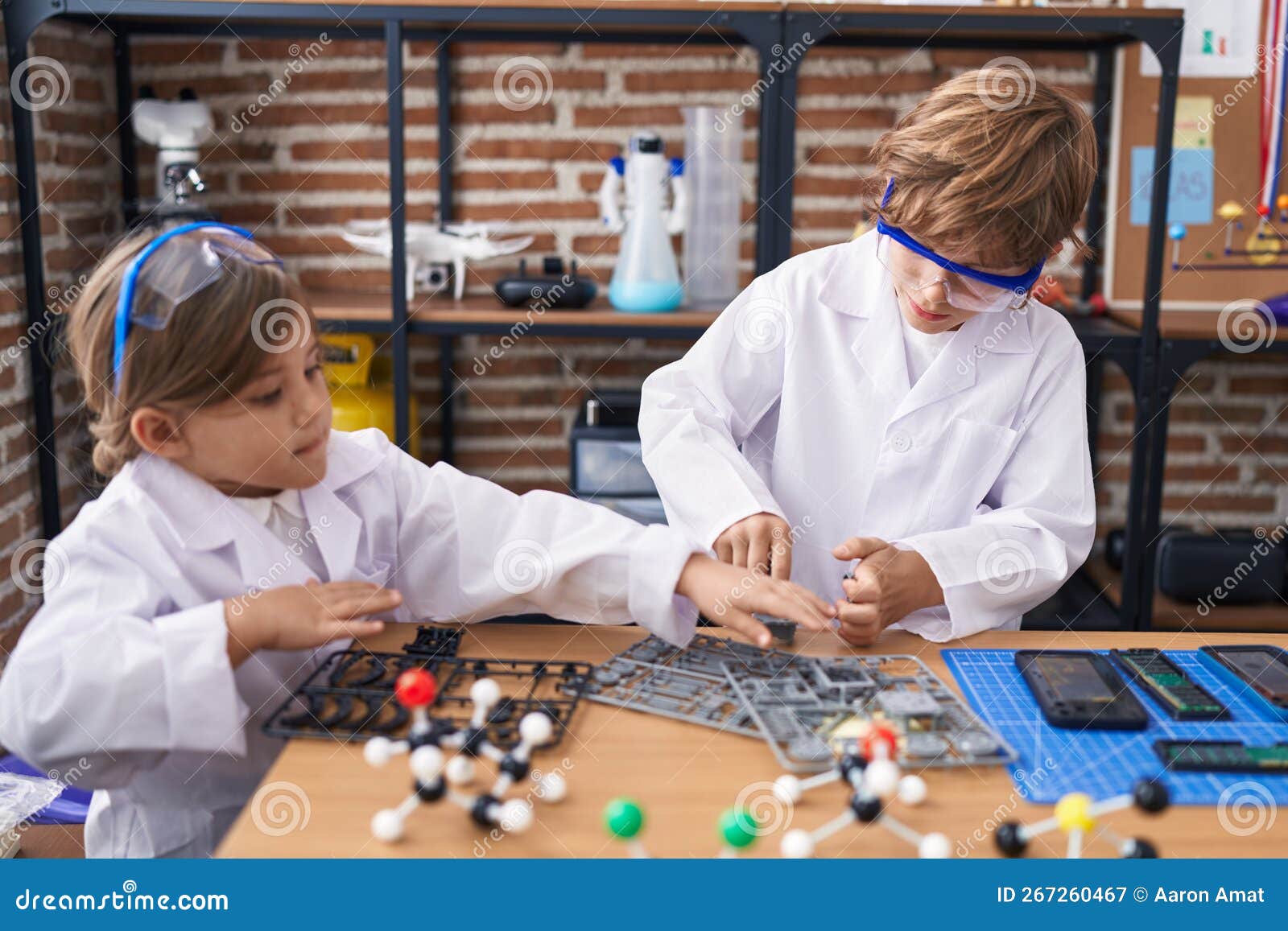 Brother and Sister Students Doing Experiment at Laboratory Classroom ...