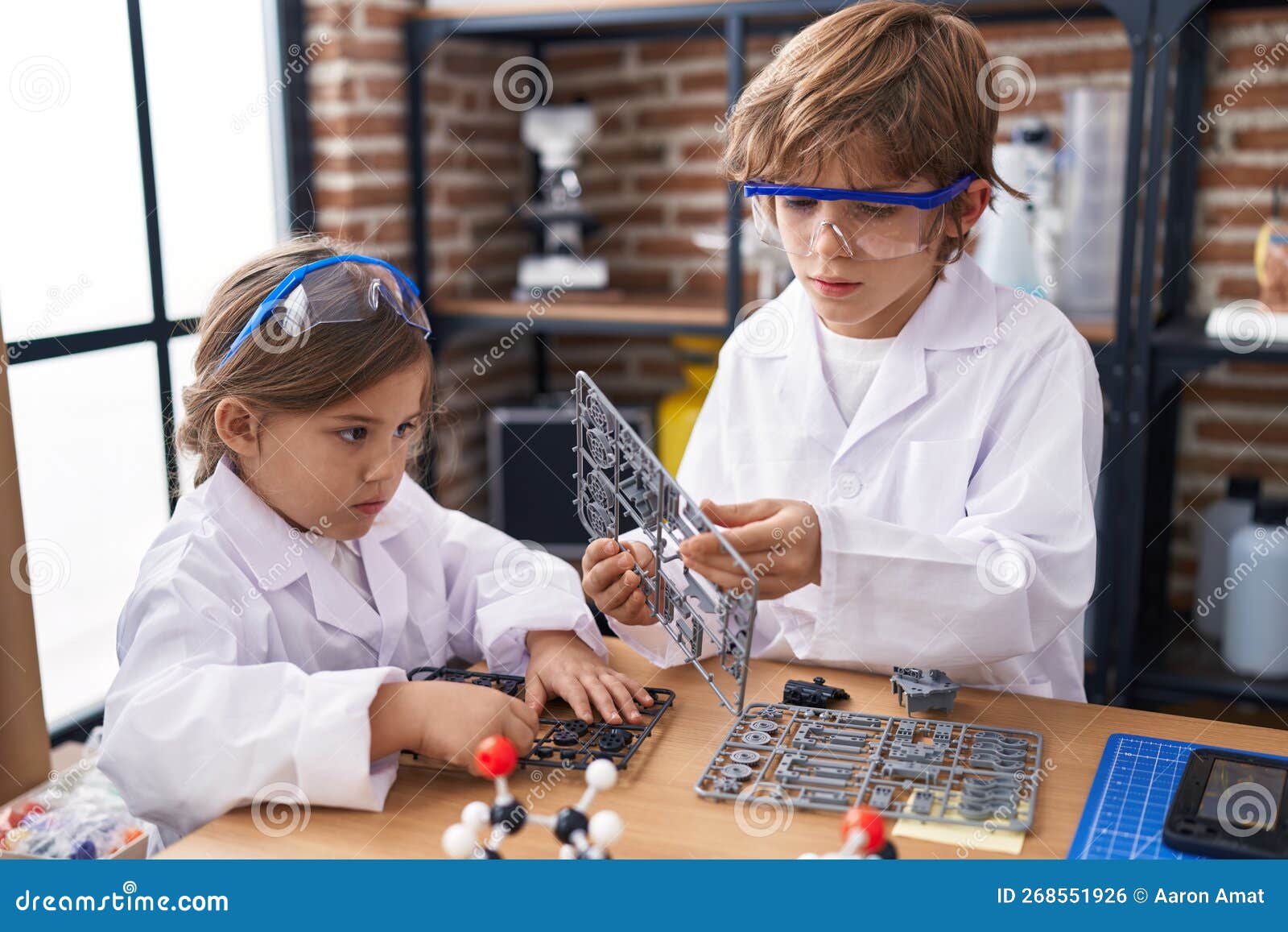 Brother and Sister Students Doing Experiment at Laboratory Classroom ...