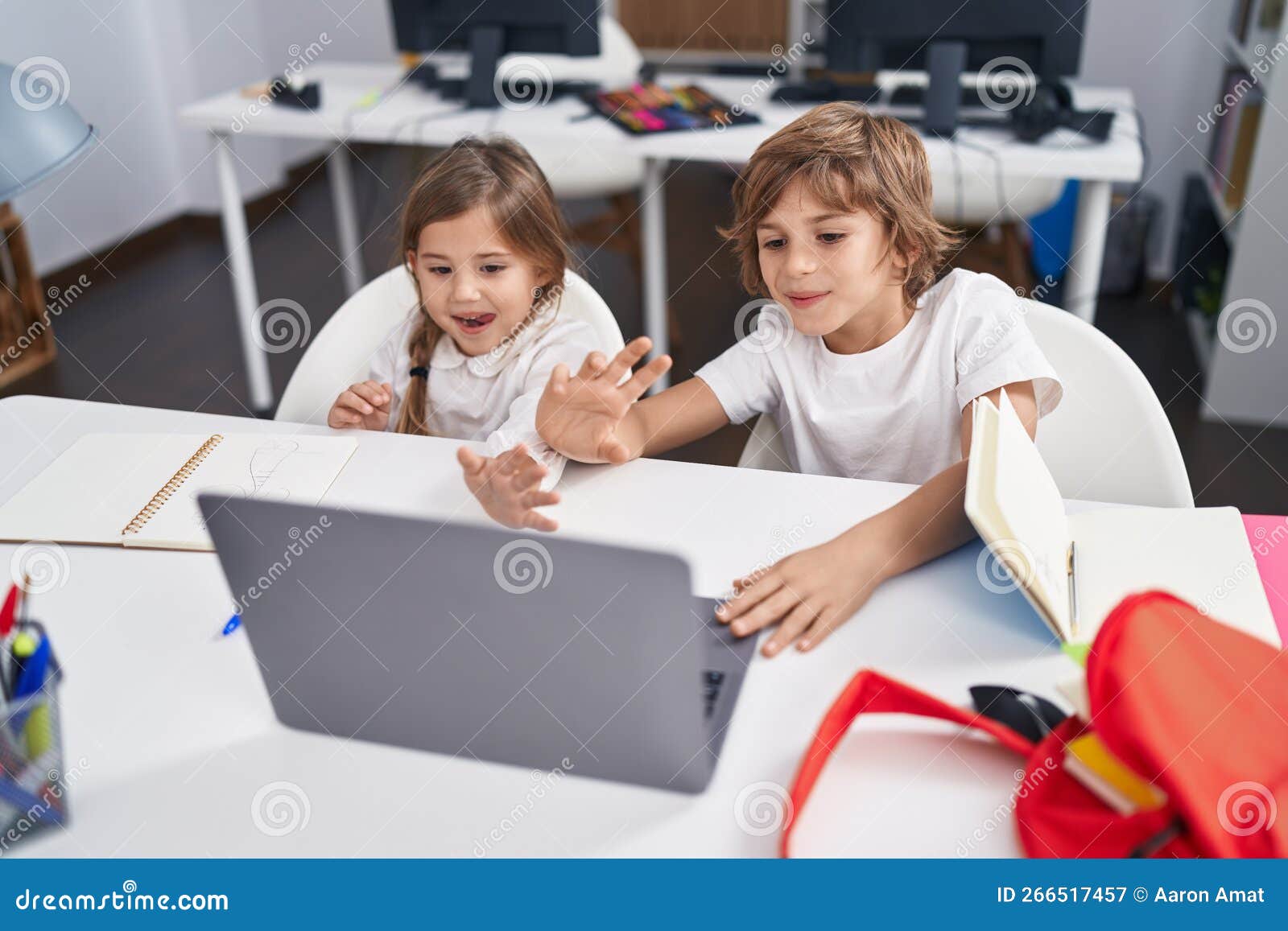 Brother and Sister Students Having Long Distance Education at Classroom ...