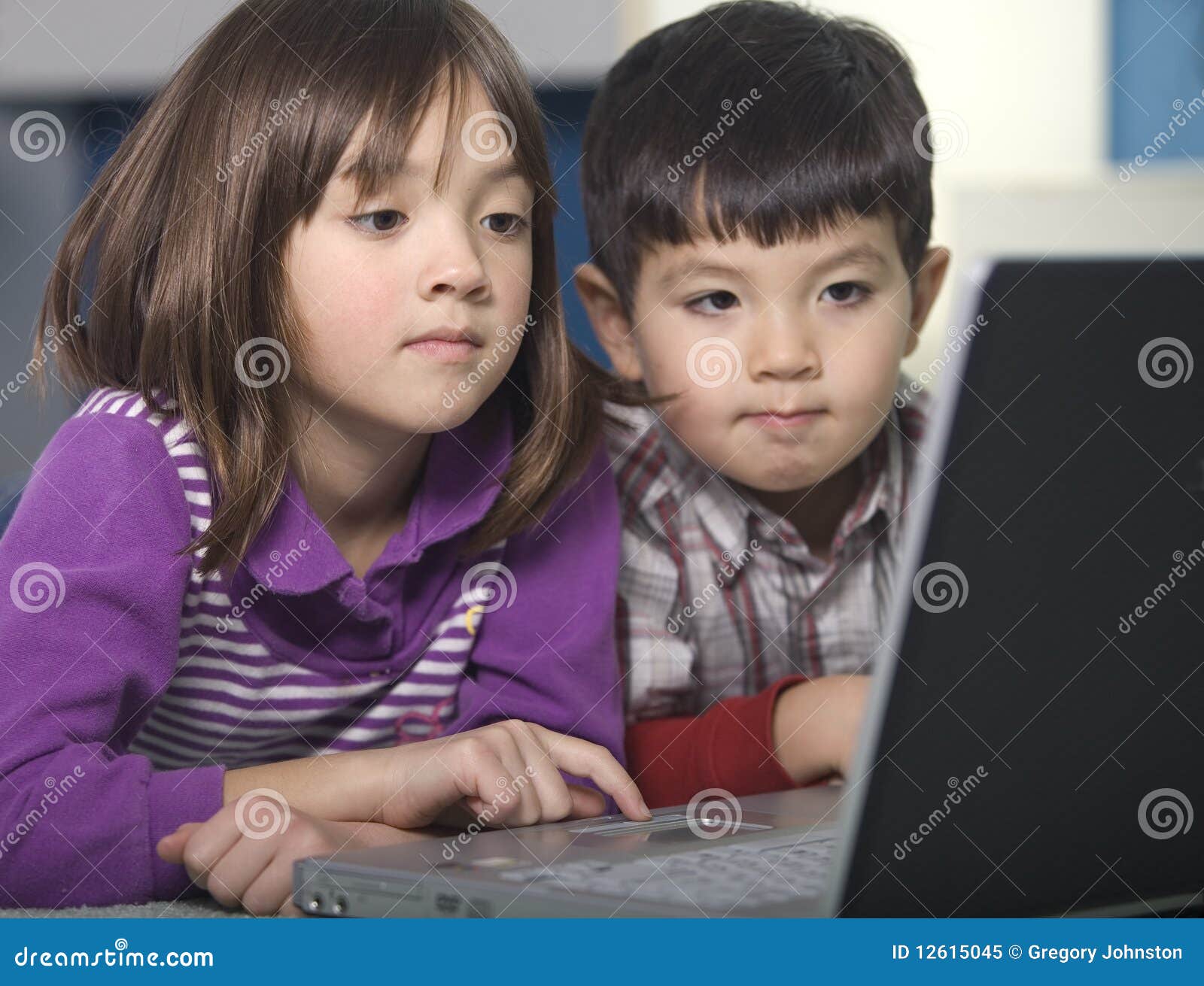 Brother and Sister Use the Laptop. Stock Image - Image of computer ...
