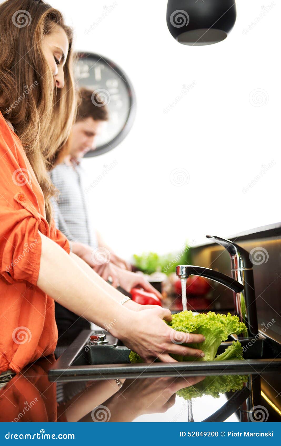 Brother and Sisters Cooking Meal Together. Stock Photo - Image of food ...