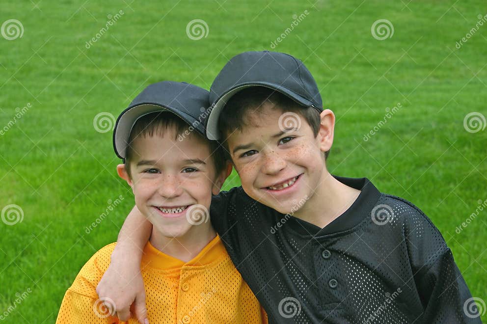 Brothers in Baseball Uniforms Stock Photo - Image of american, happy ...