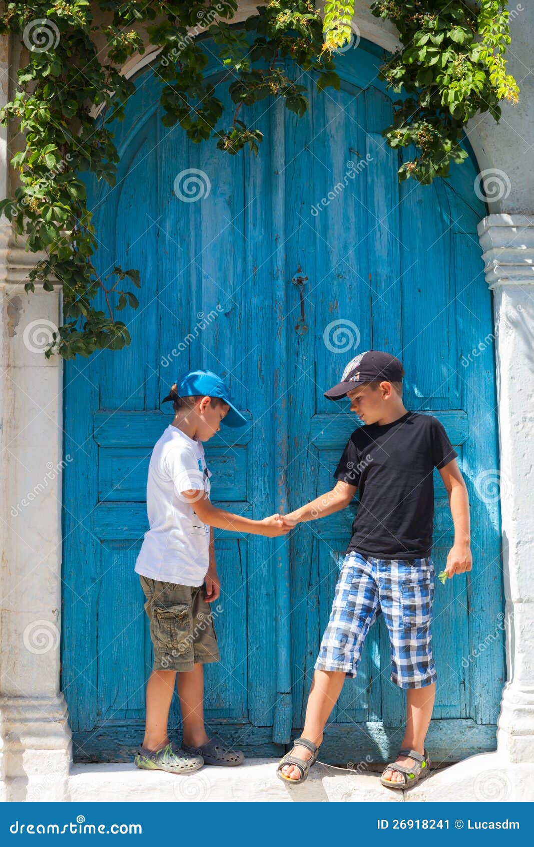 Brothers handshake stock image. Image of brother, people - 26918241