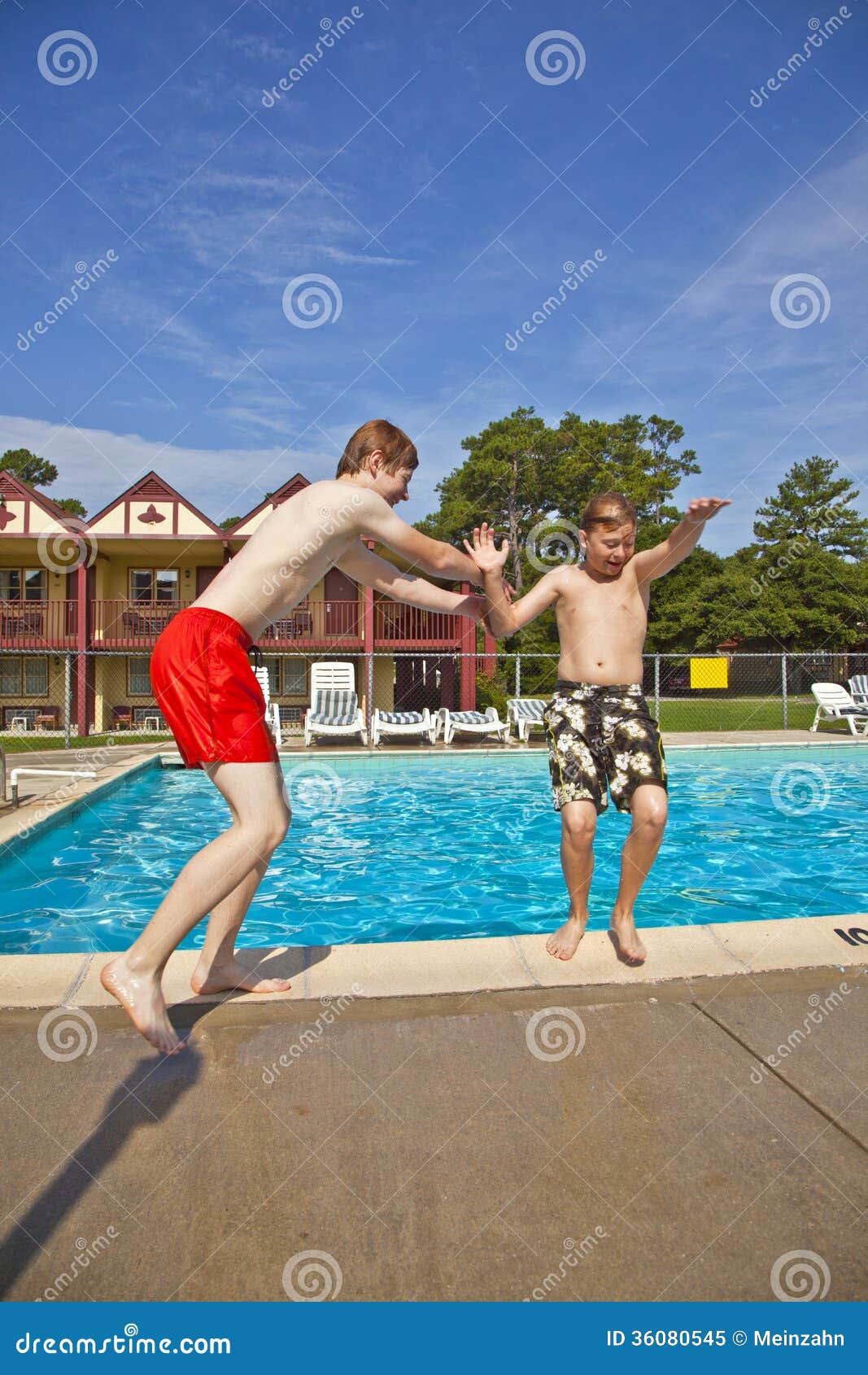 Brothers Having Fun at the Pool Stock Image - Image of friendly, boys ...