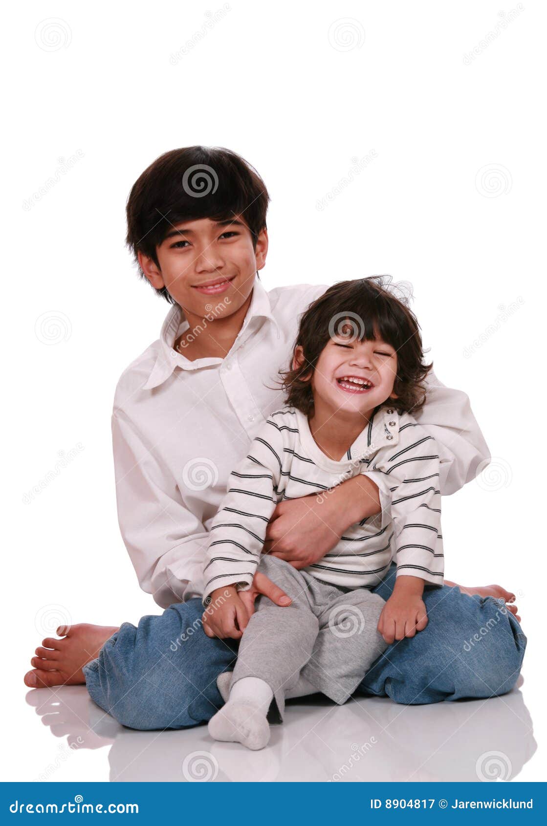 Brothers laughing together stock image. Image of mixed - 8904817