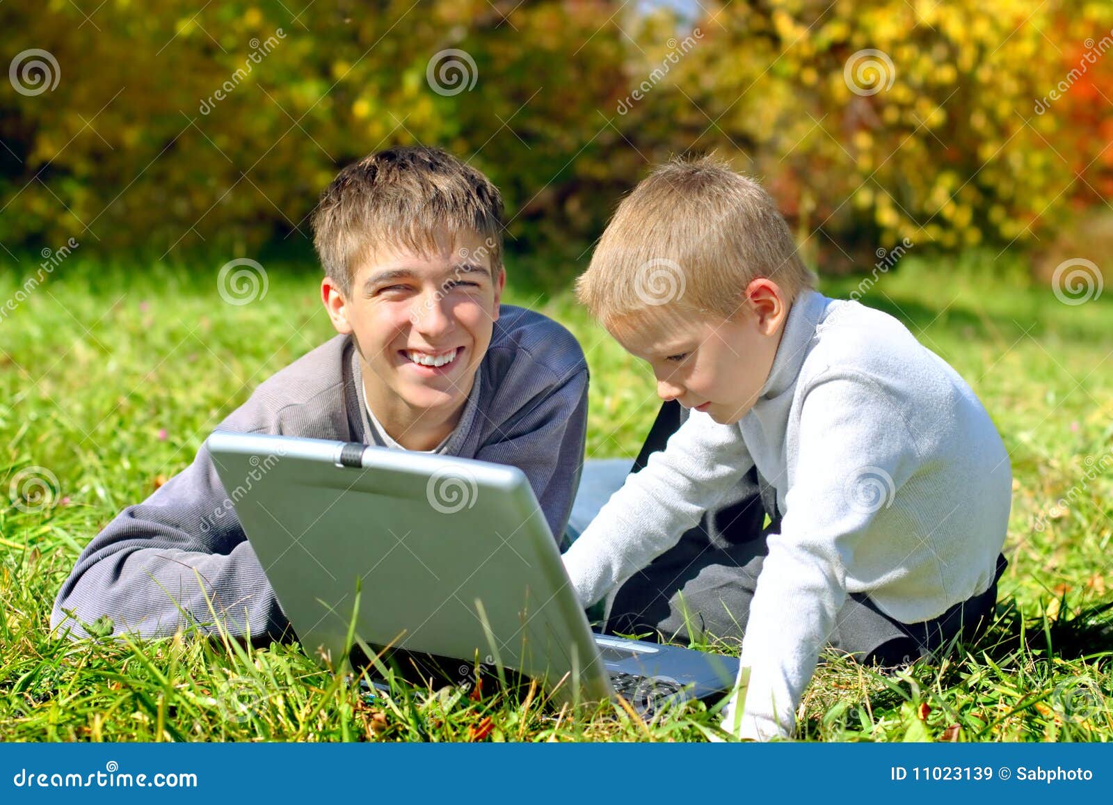 Brothers with notebook stock image. Image of hold, lifestyles - 11023139