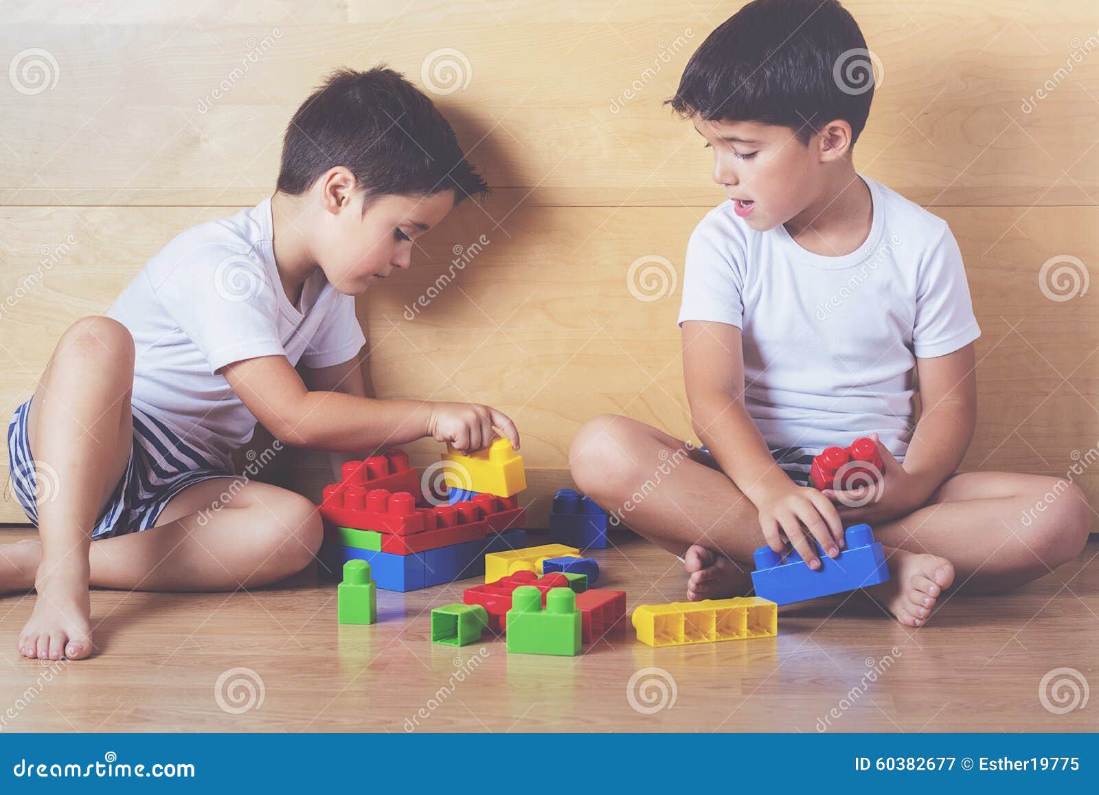 Brothers stock image. Image of concentration, blocks - 60382677