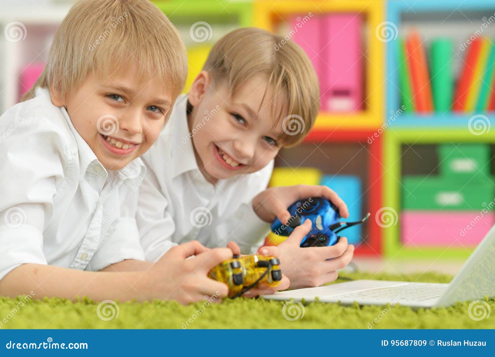 Brothers Playing a Computer Game Stock Image - Image of joystick ...