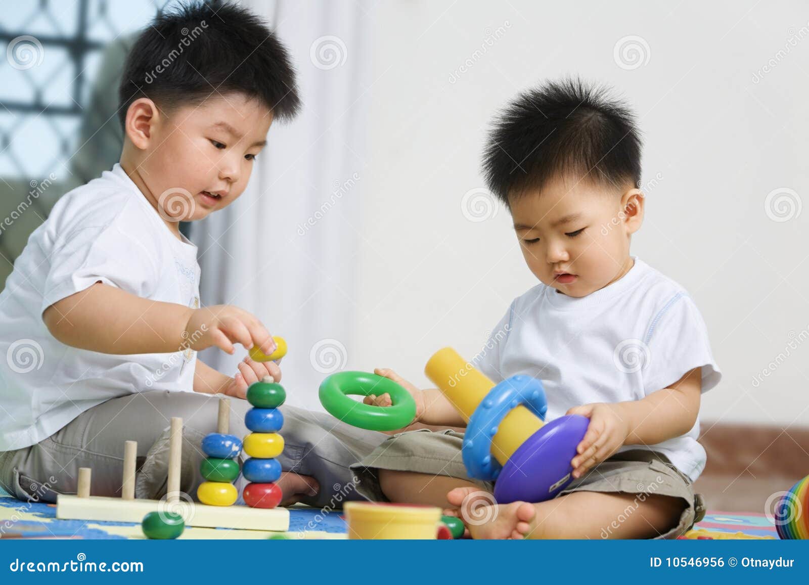 Brothers playing together stock photo. Image of little - 10546956