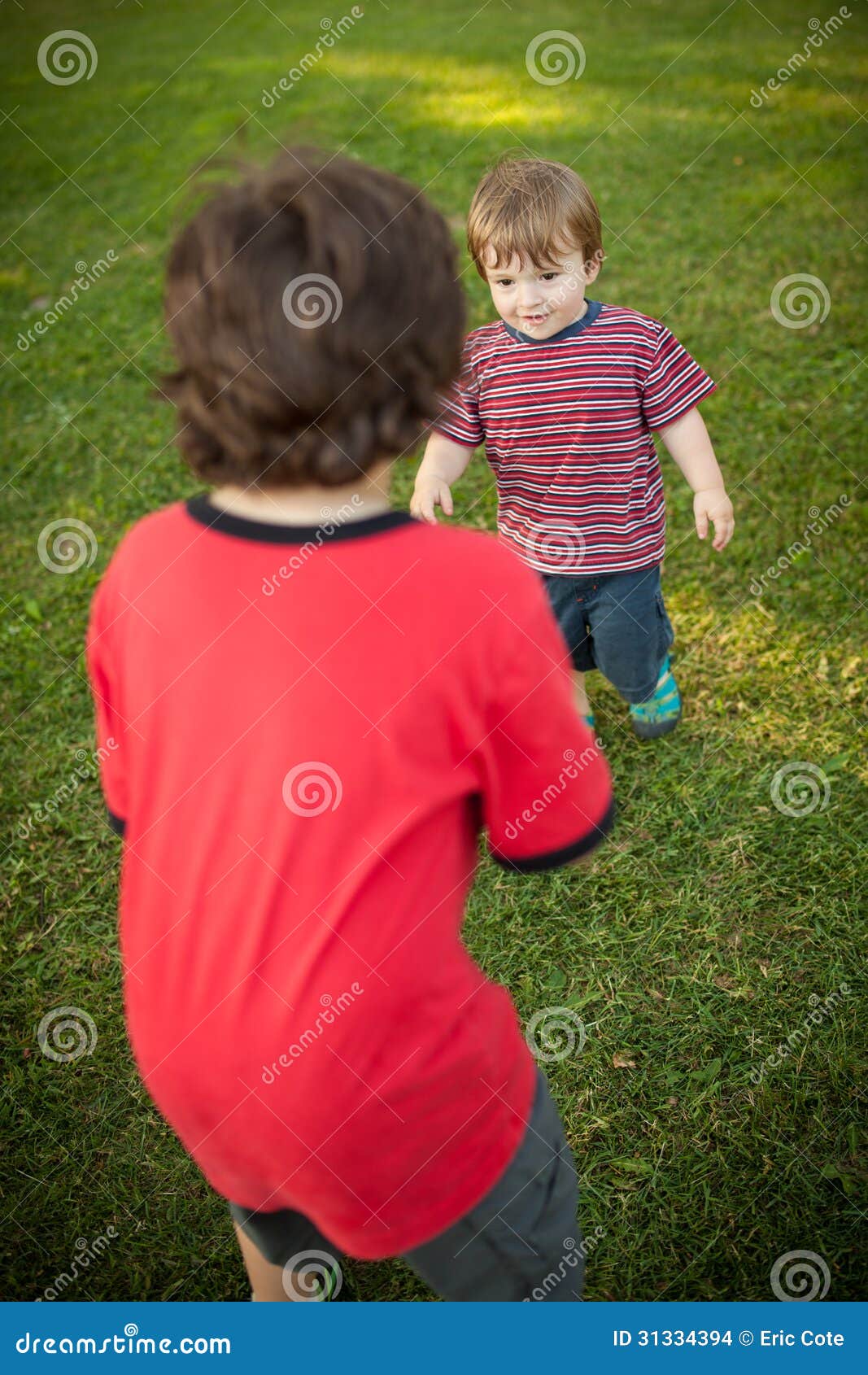 Brothers playing together stock photo. Image of family - 31334394