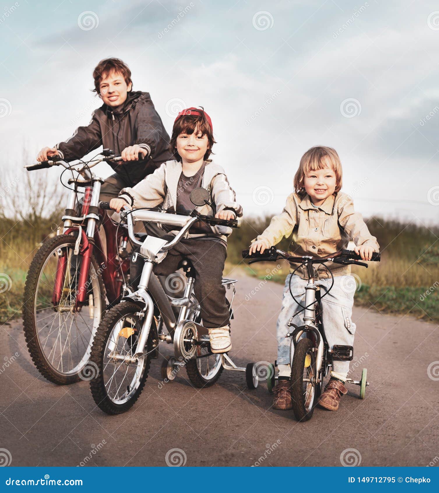 Brothers ride on bikes stock image. Image of american - 149712795