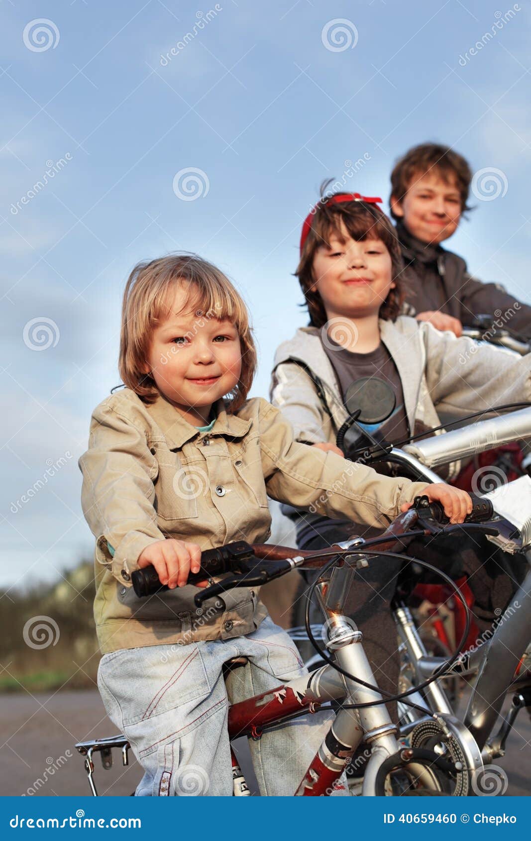 Brothers ride on bikes stock photo. Image of male, lifestyles - 40659460