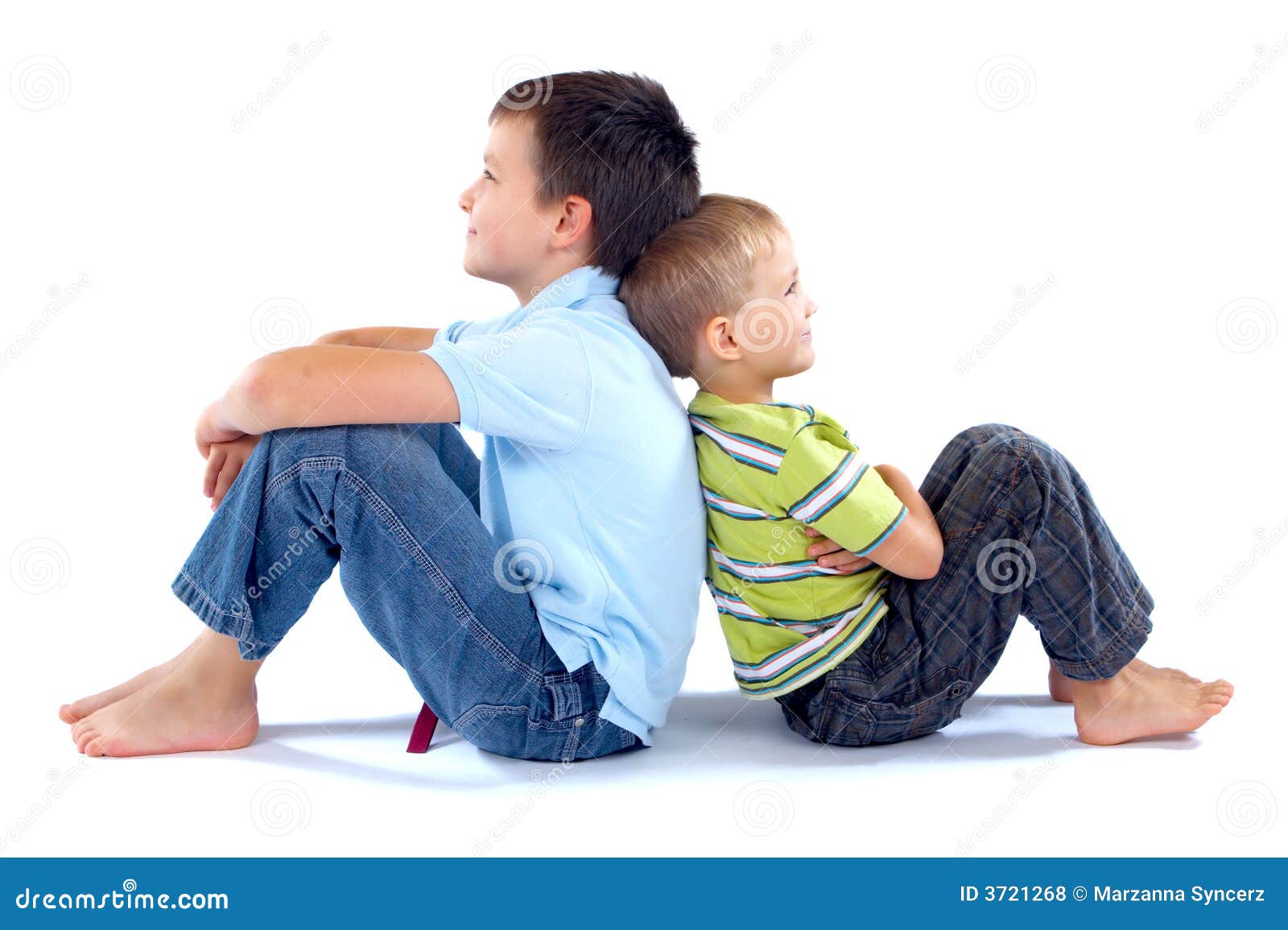 Brothers Seated Back To Back Stock Photo - Image of smile, isolated ...
