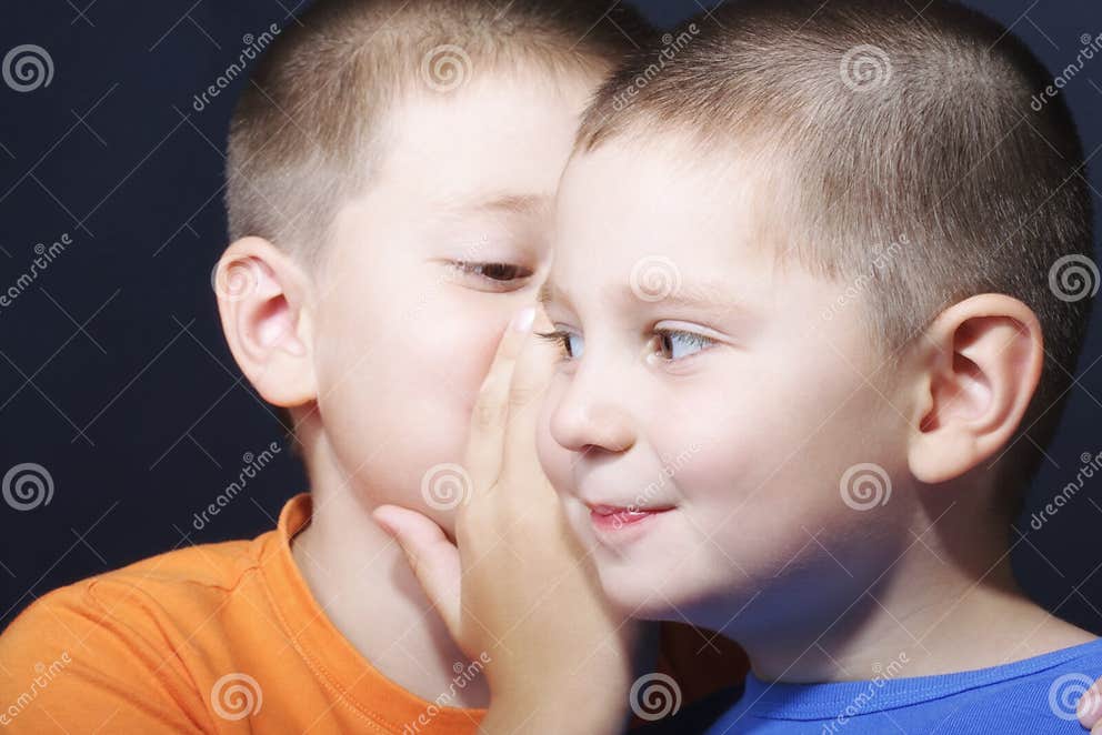 Brothers sharing secrets stock photo. Image of caucasian - 13521220