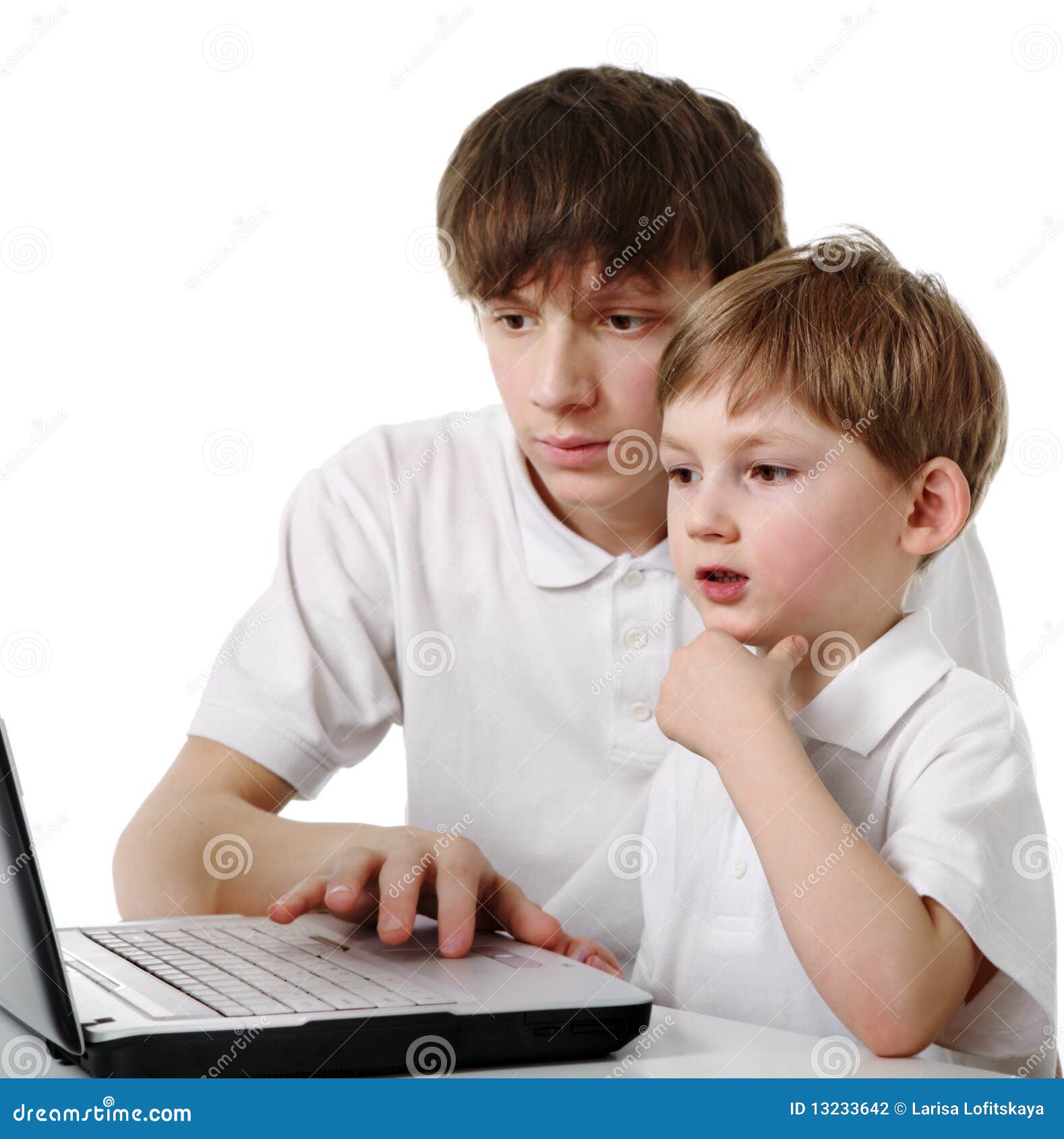 Brothers using laptop stock photo. Image of sitting, communication ...
